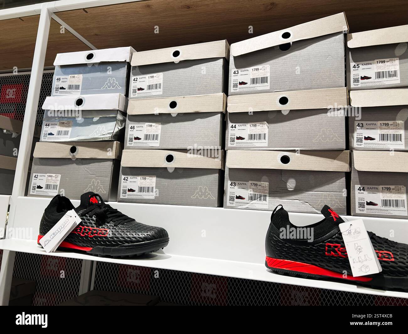 Lviv, Ukraine - February 16, 2025: Row of boxed sports Kappa shoes with ...