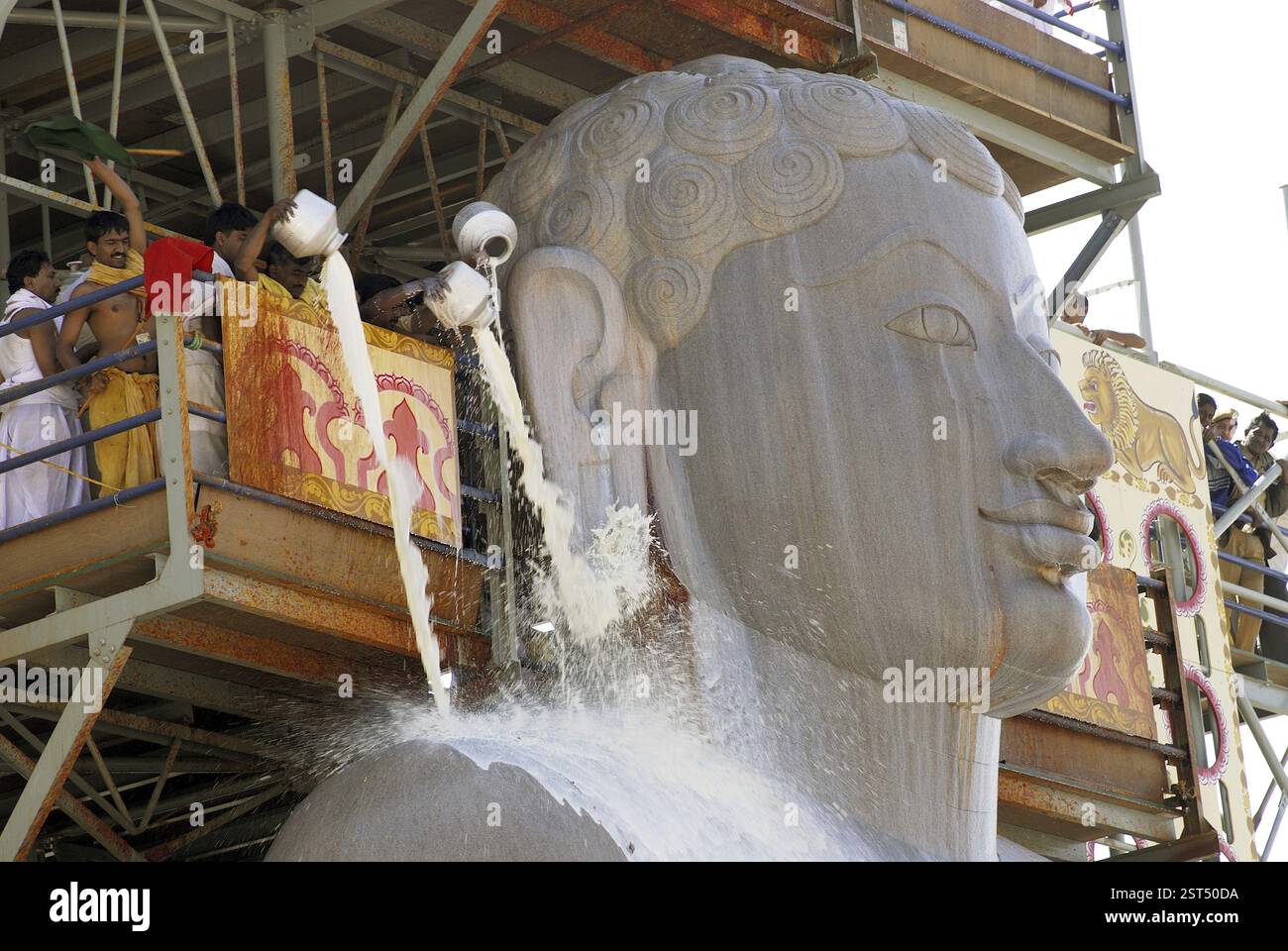Jain Devotees pouring milk on the head of 58.8 feet monolithic Statue ...