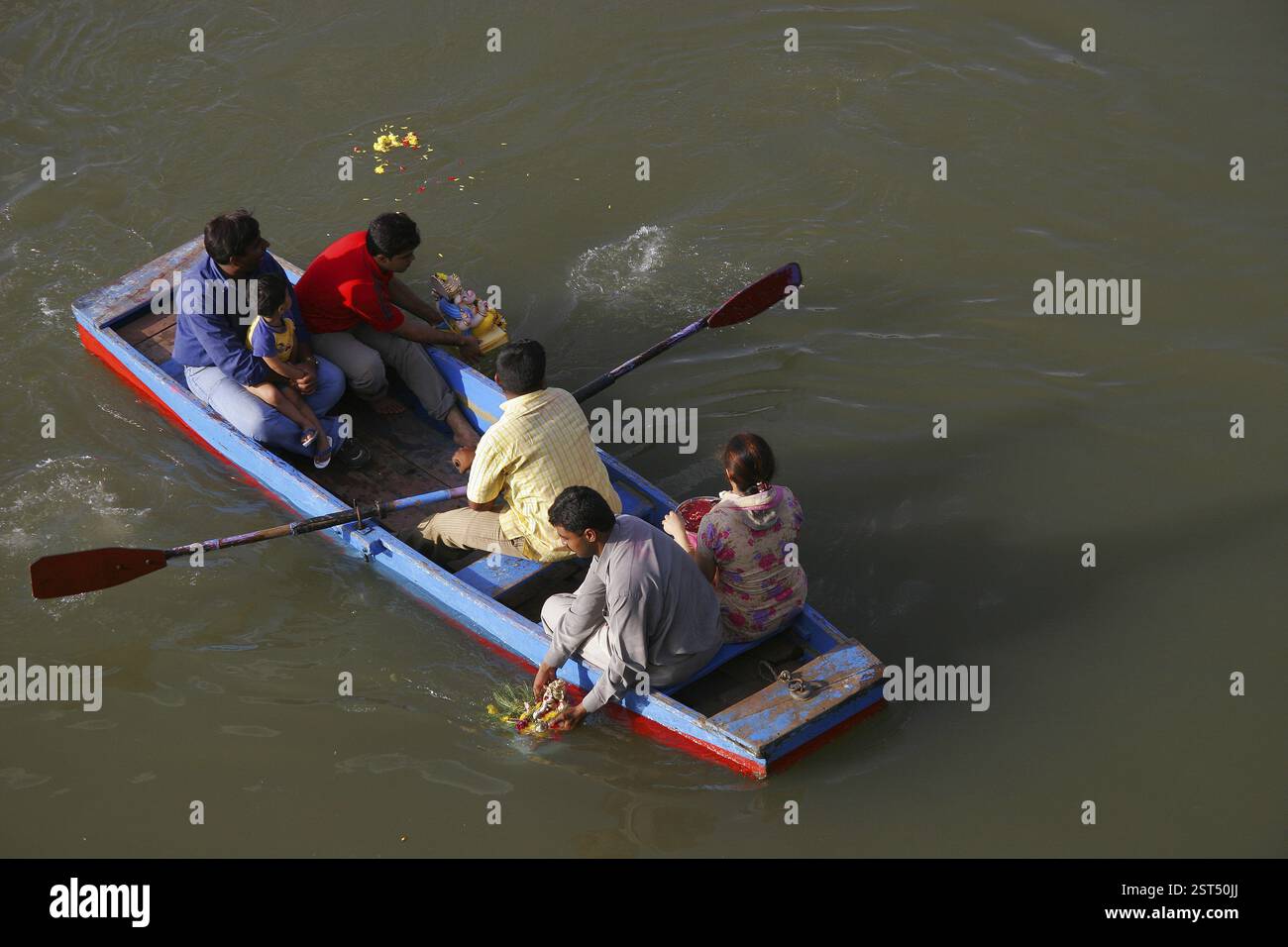 Festival The immersion of idols of Lord Ganesh ganpati, the elephant headed God, in the Mula ...