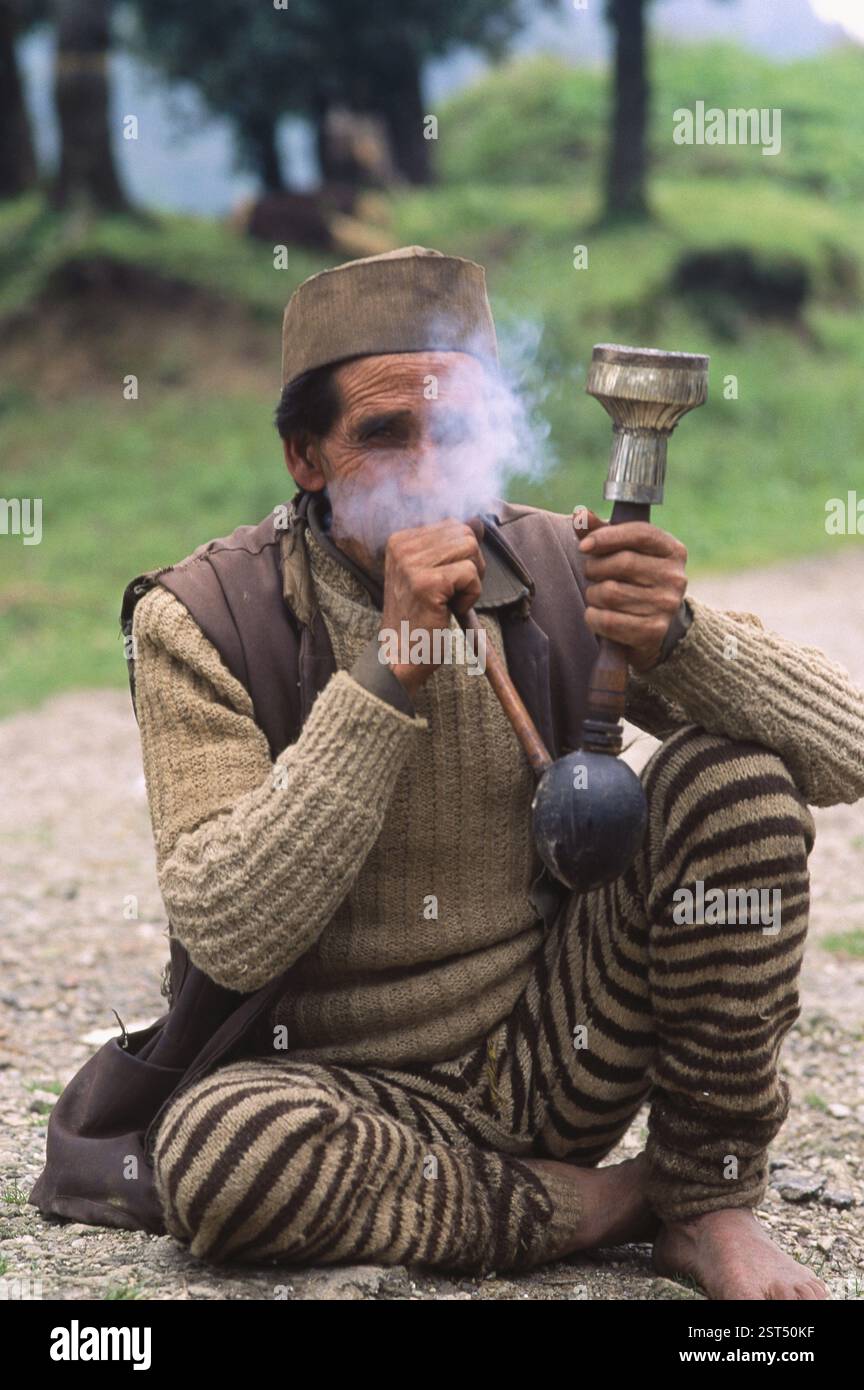 A garhwali man smocking hookah, garhwal, uttaranchal, india Stock Photo ...