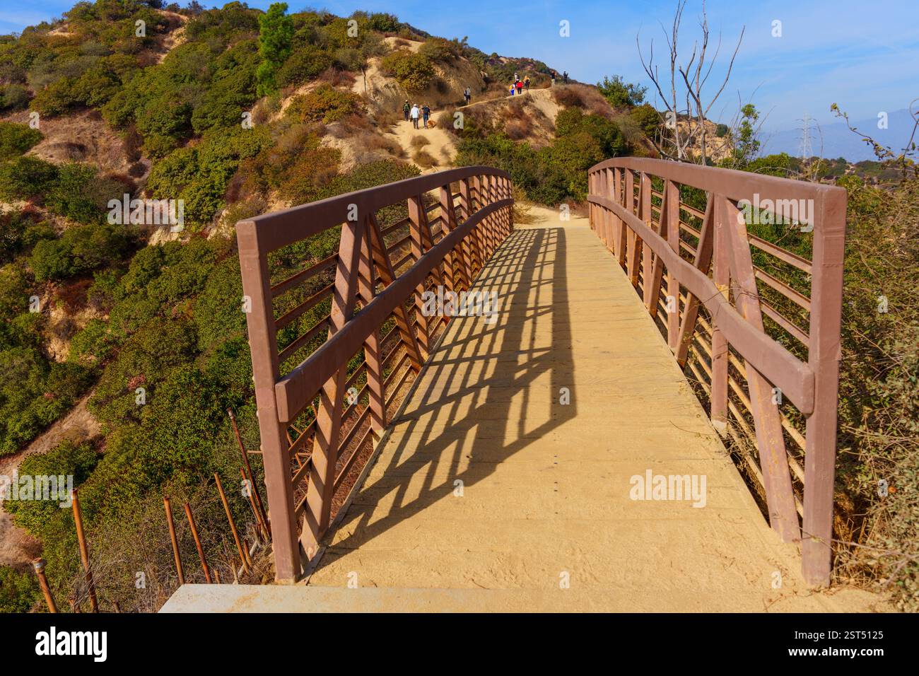 Charming wooden footbridge on Henry’s Trail in Griffith Park, with a ...