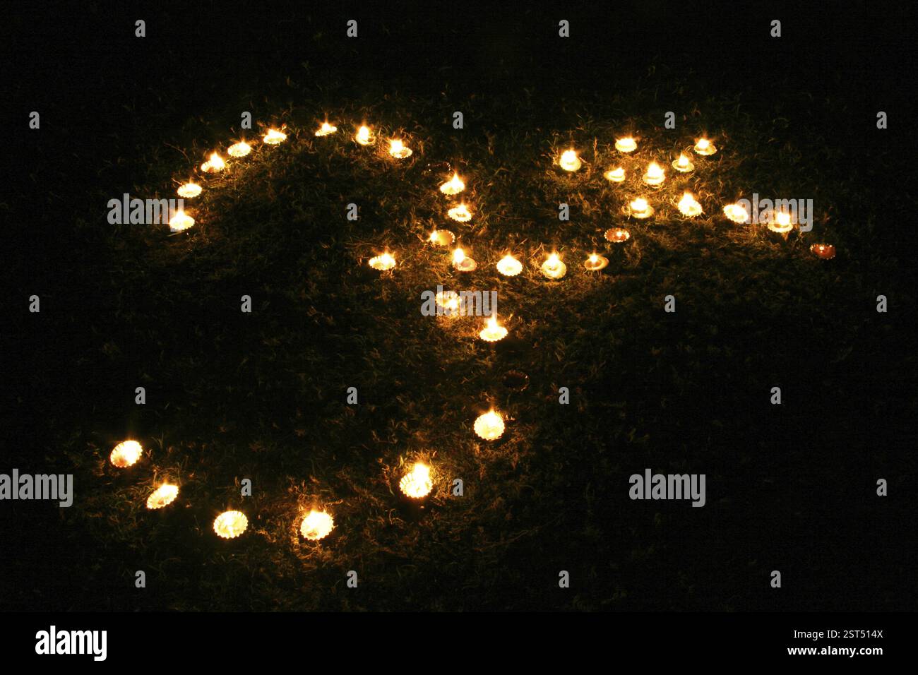 Lighting of oil lamps called 'Divas' in Om shape on the occasion of ...