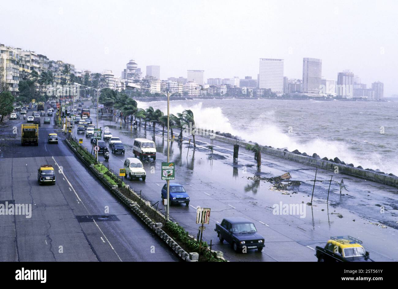 Traffic and tidal waves at marine drive, bombay mumbai, maharashtra ...
