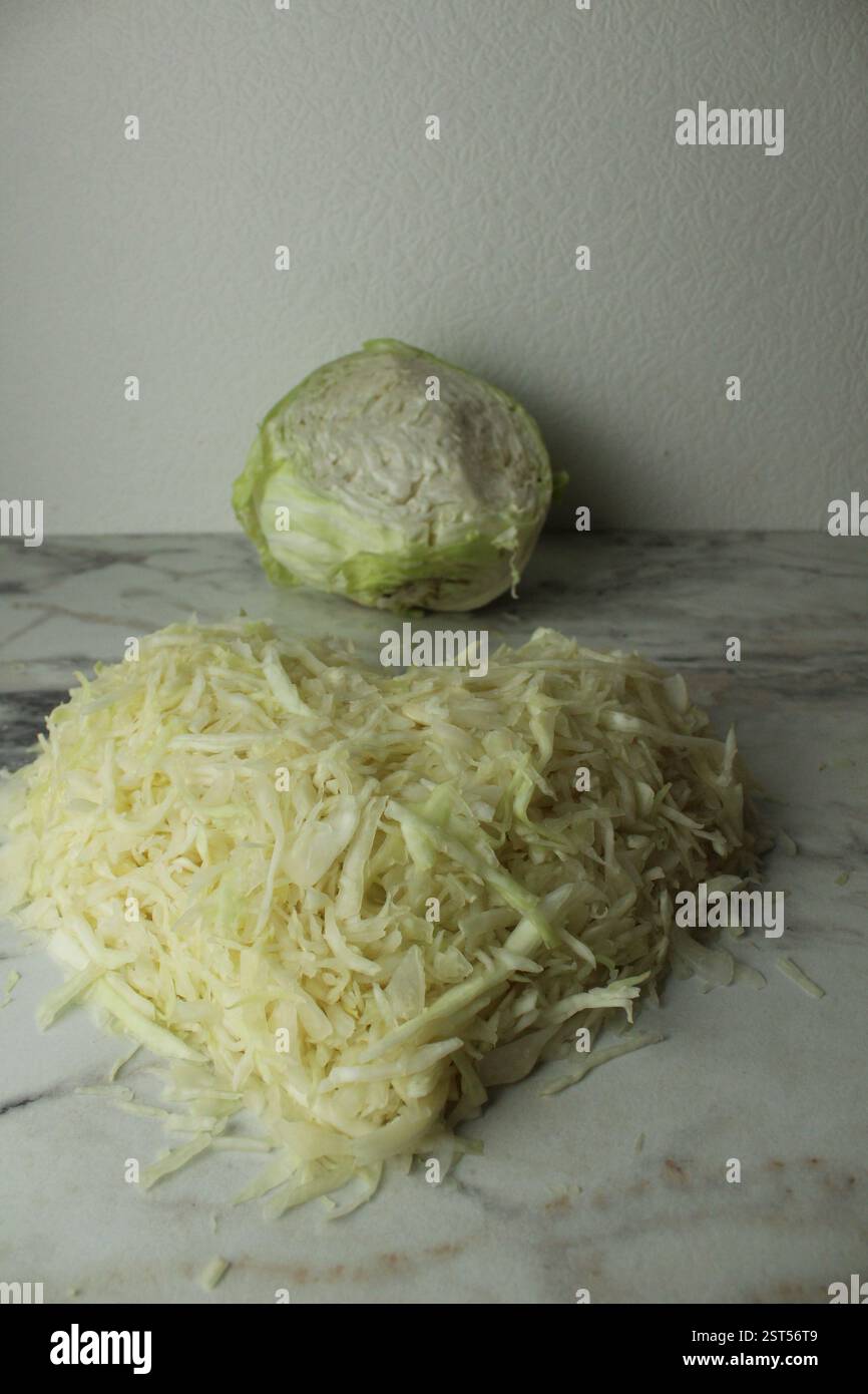 fermented cabbage. Shredded white cabbage Stock Photo - Alamy