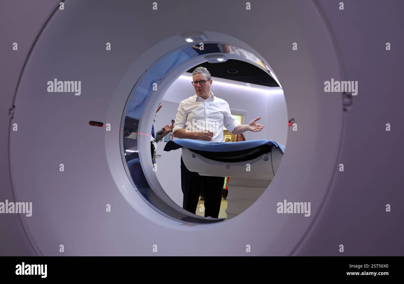 Prime Minister Sir Keir Starmer views a CT (computed tomography ...