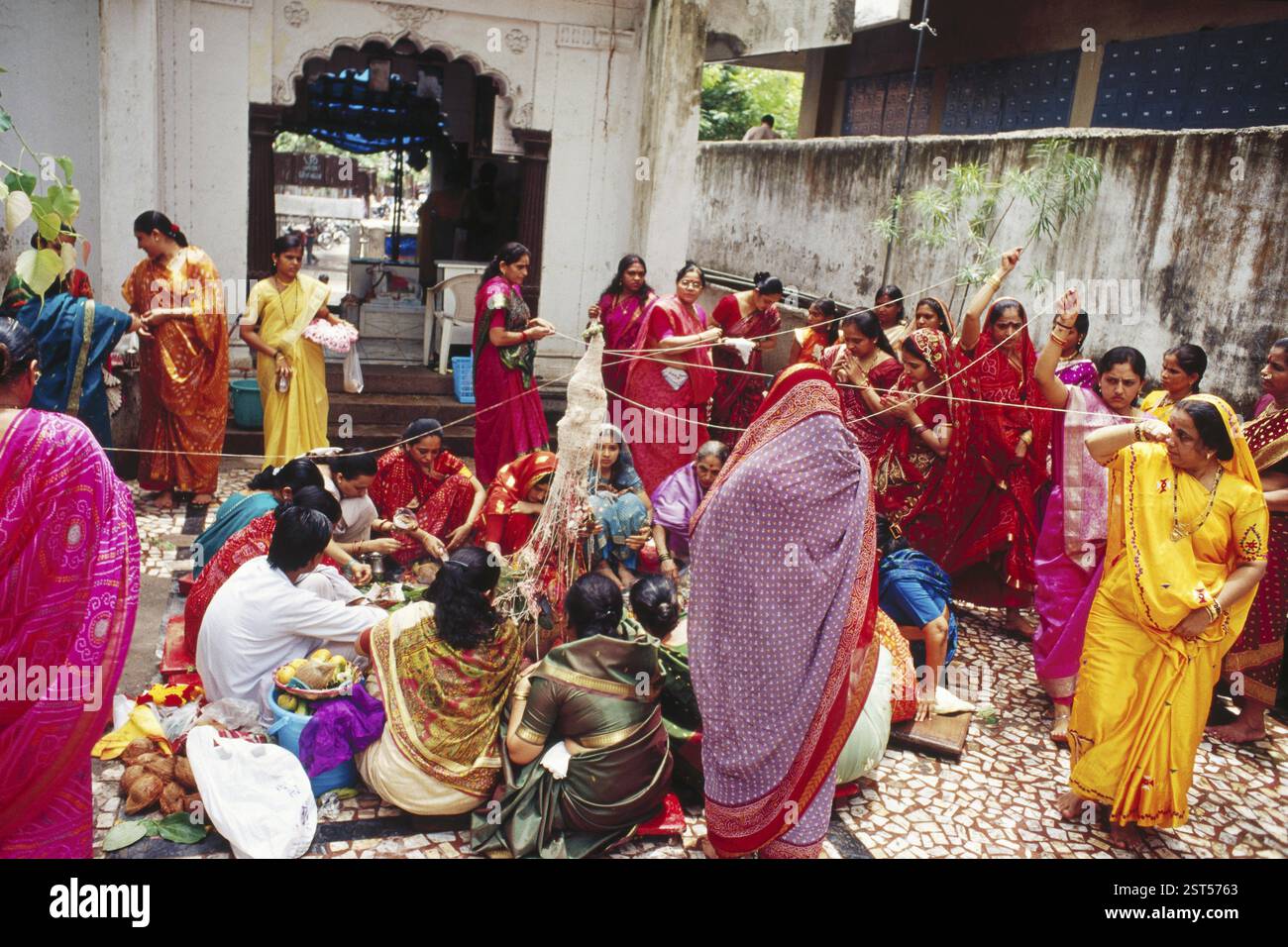 Women Worshiping holding thread, Vat Savitri Festival or Vat Purnima ...