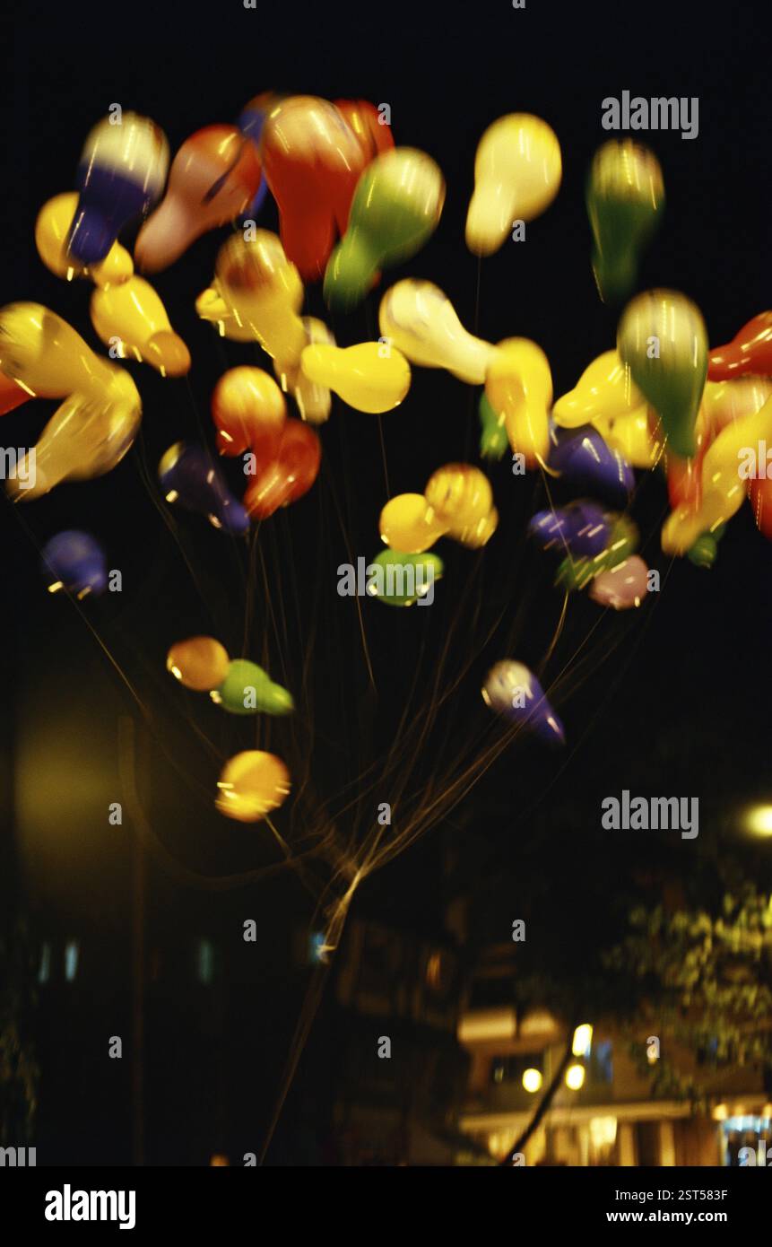 Balloons floating in air Stock Photo - Alamy
