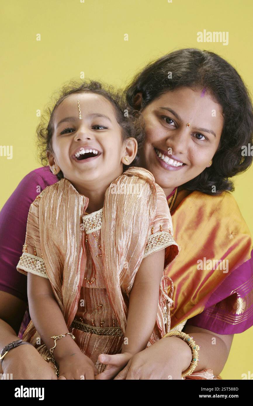 Indian child Radha smiling with her mother, MR Stock Photo - Alamy