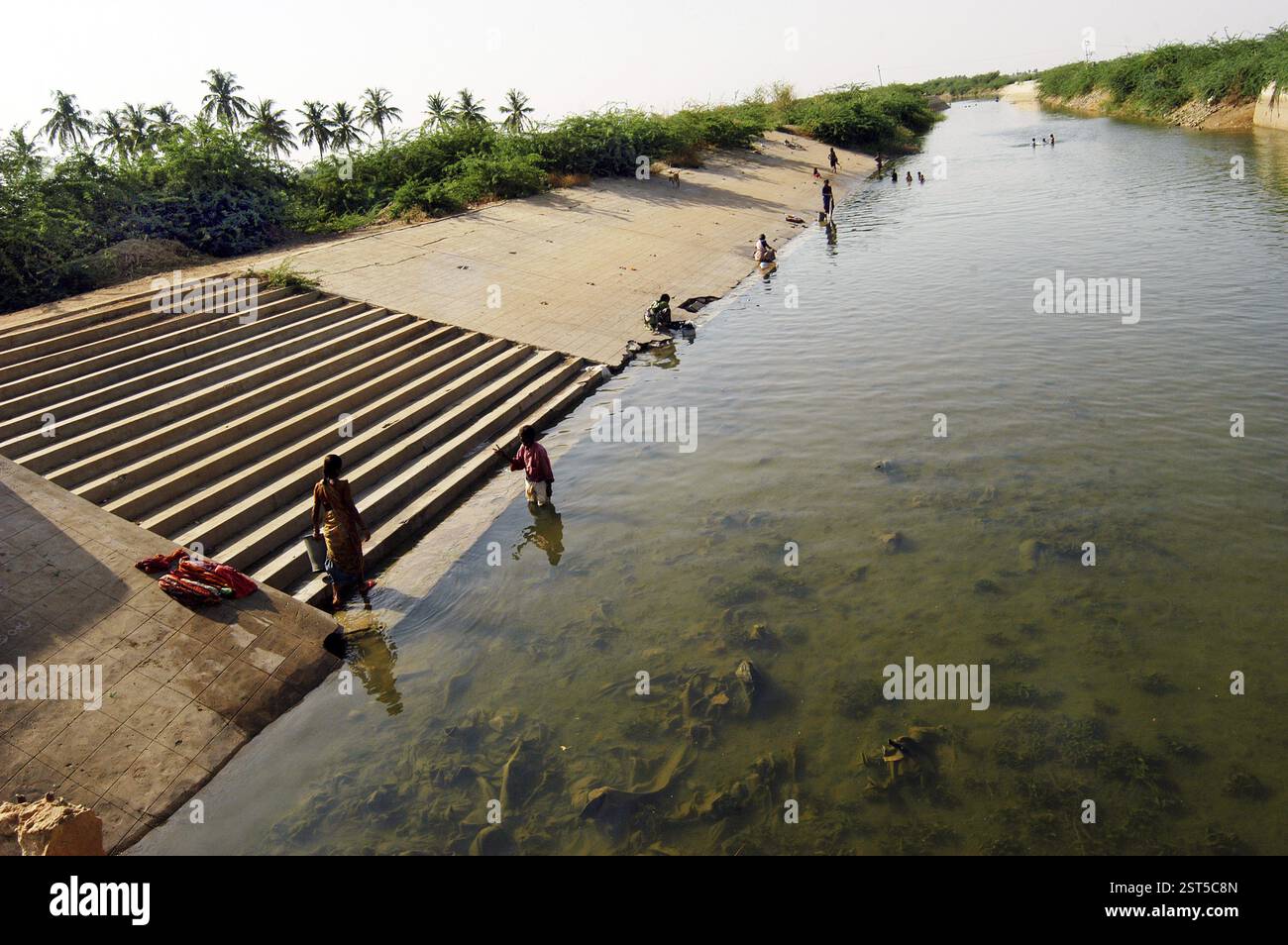 Man made canal is filled with water for the use in farming in village ...