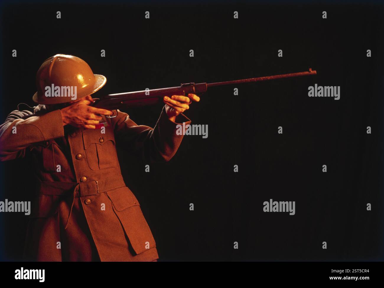 Military soldier holding gun and pointing on target Stock Photo - Alamy