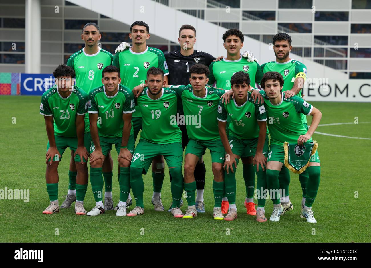 Shenzhen. 17th Feb, 2025. Players of Syria pose for a group photo ...