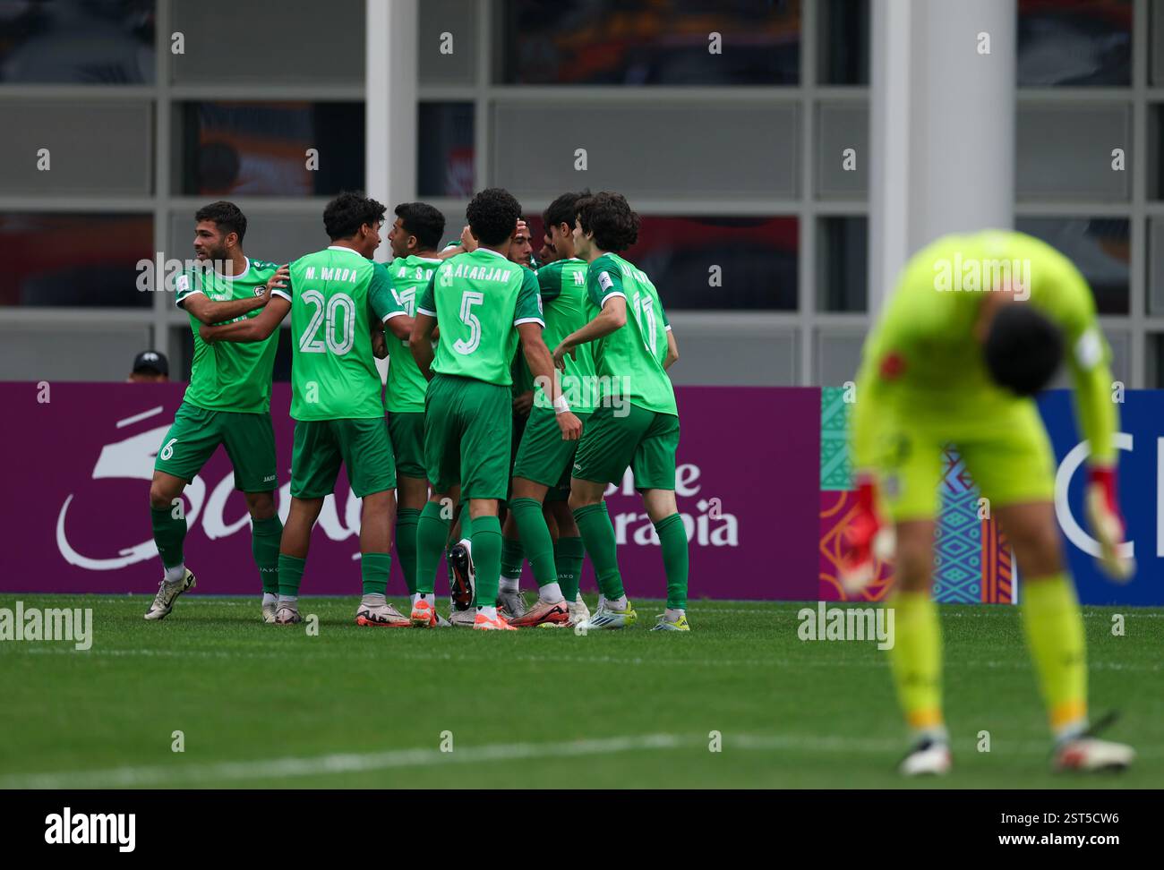 Shenzhen. 17th Feb, 2025. Players of Syria celebrate a goal during a ...