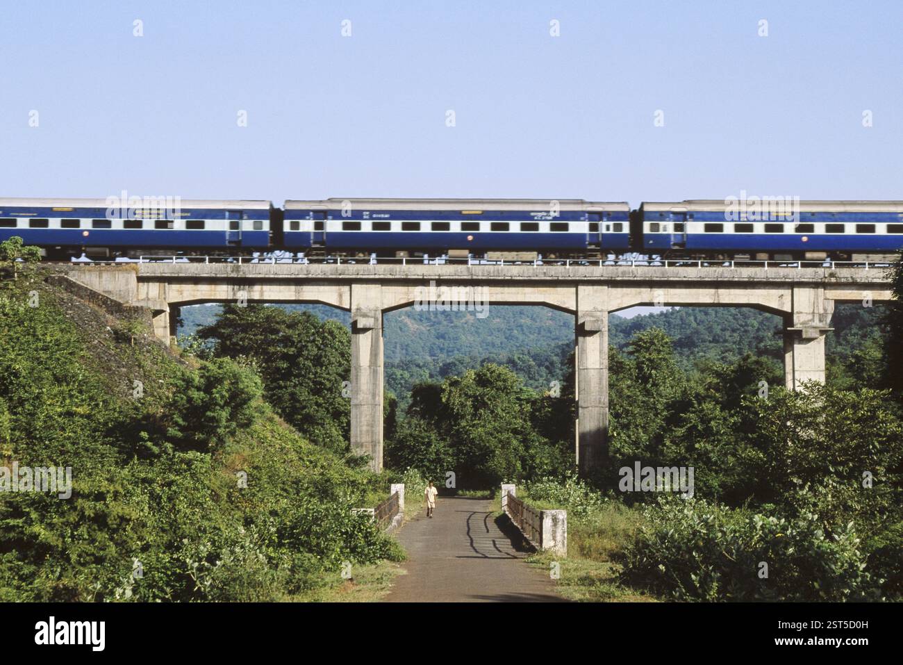 Konkan railway train on bridge at chiplun, maharashtra, india Stock ...