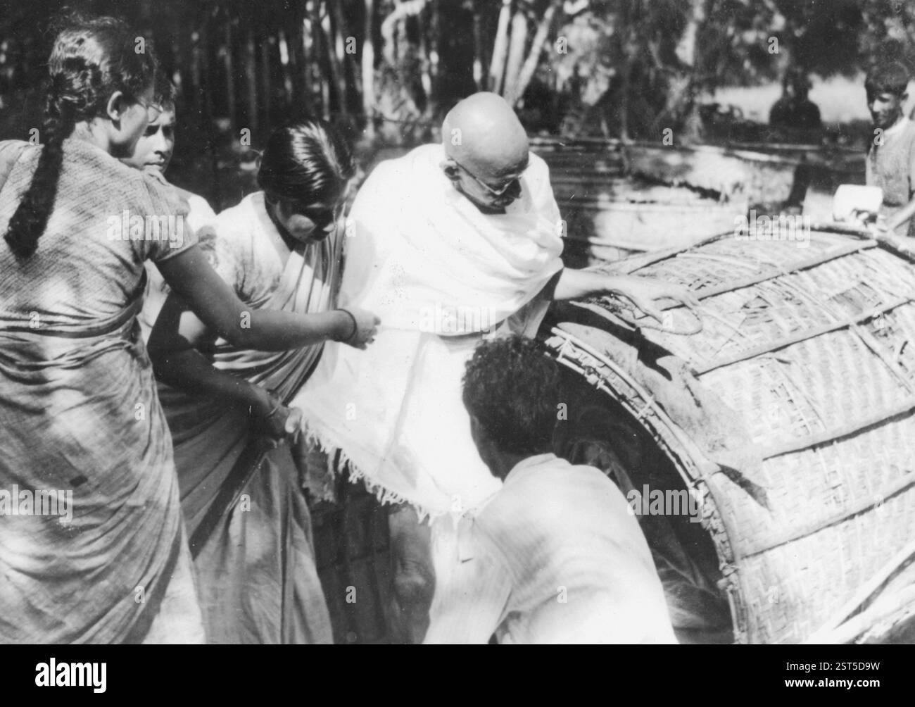 Mahatma Gandhi on a boat on his way to Midnapur, East Bengal, India ...