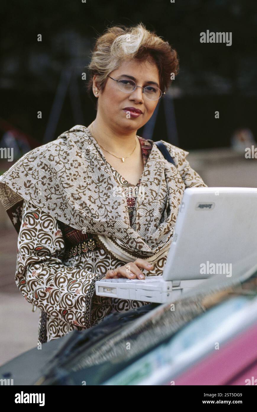 Indian lady working on laptop hi-res stock photography and images - Alamy