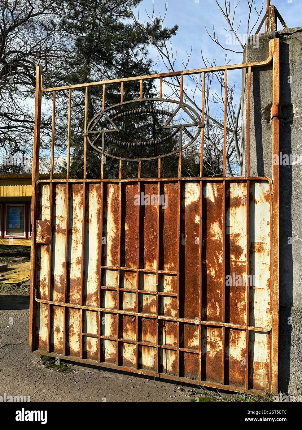 Rusty old metal door of an industrial area Stock Photo - Alamy