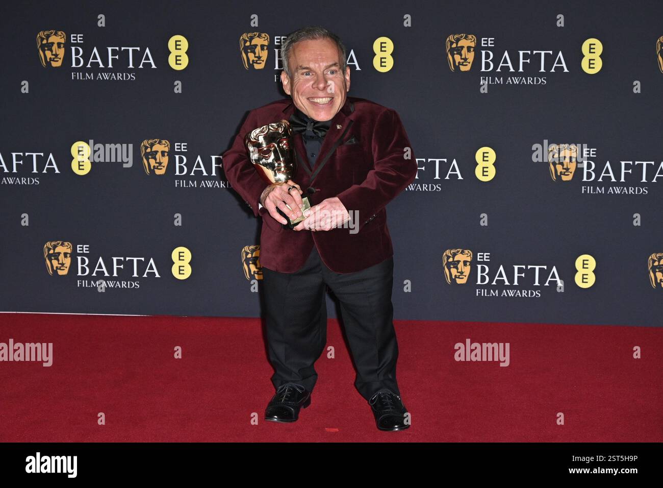 Warwick Davis attends the 2025 EE BAFTA Film Awards at The Royal ...