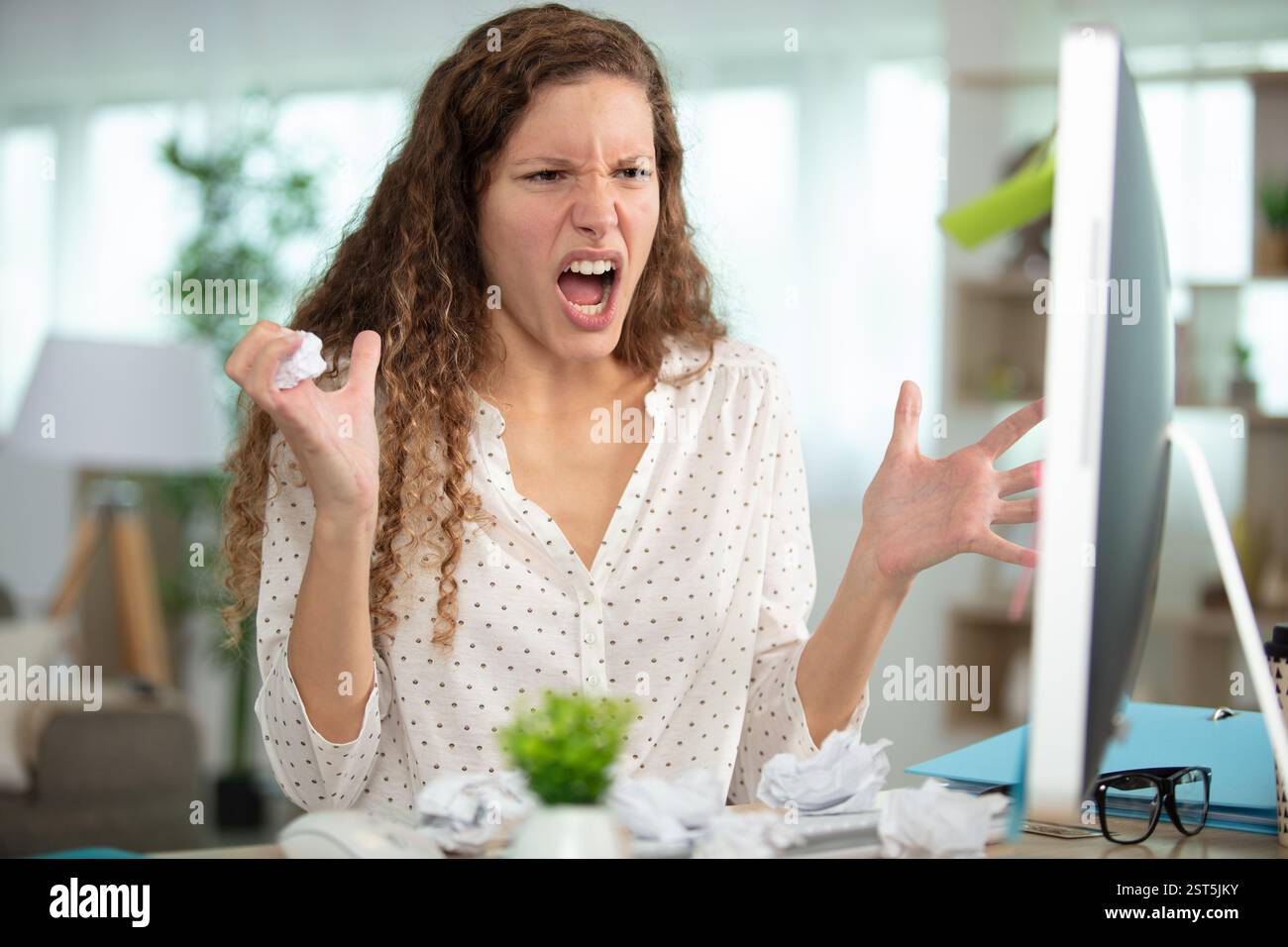 Angry furious woman working home hi-res stock photography and images ...