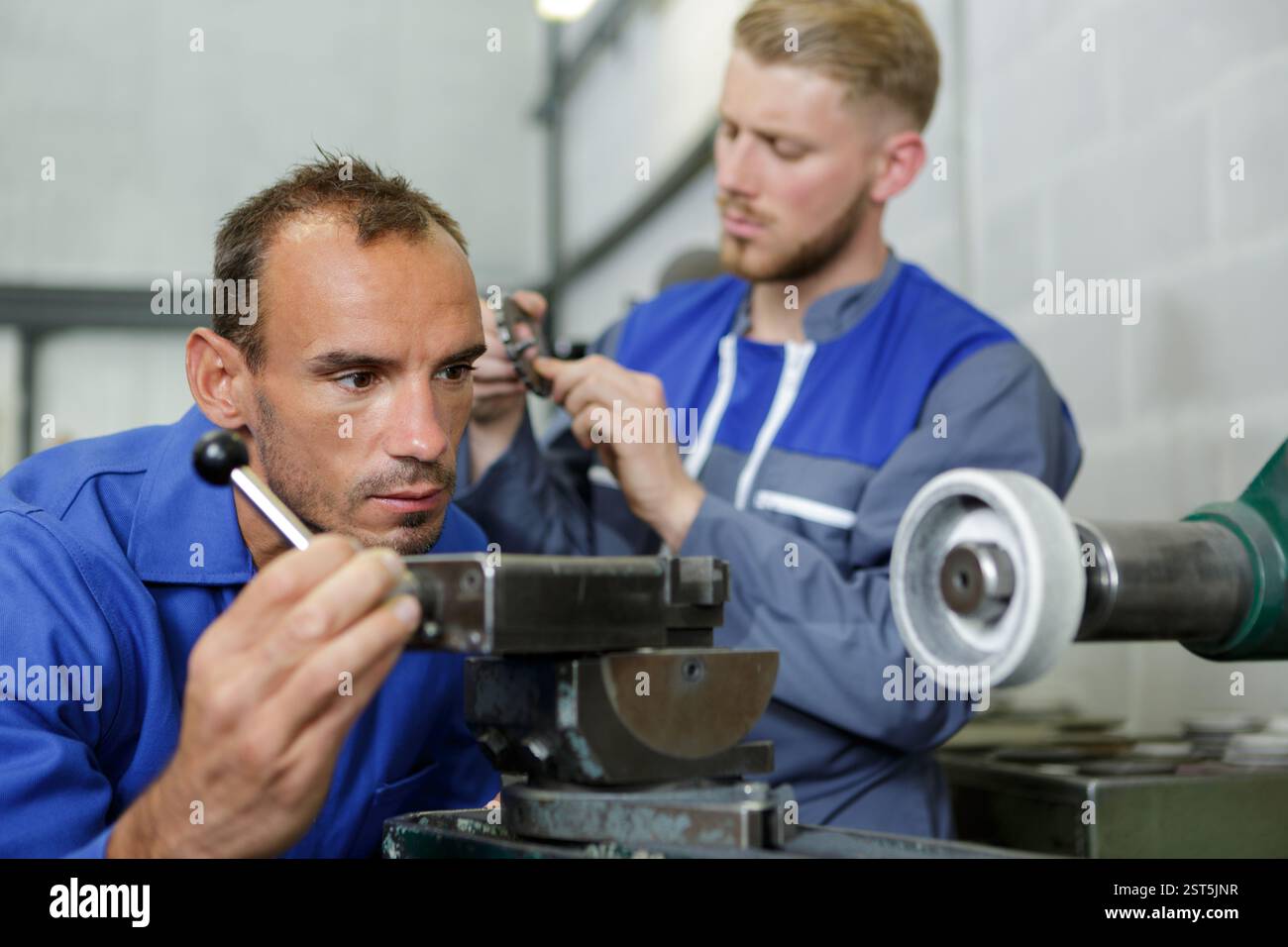 Collaboration engineering two engineers hi-res stock photography and ...