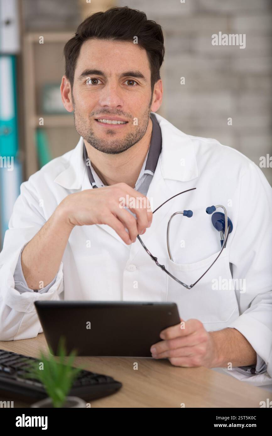 doctor man using tablet computer to check virtual disease treatment ...