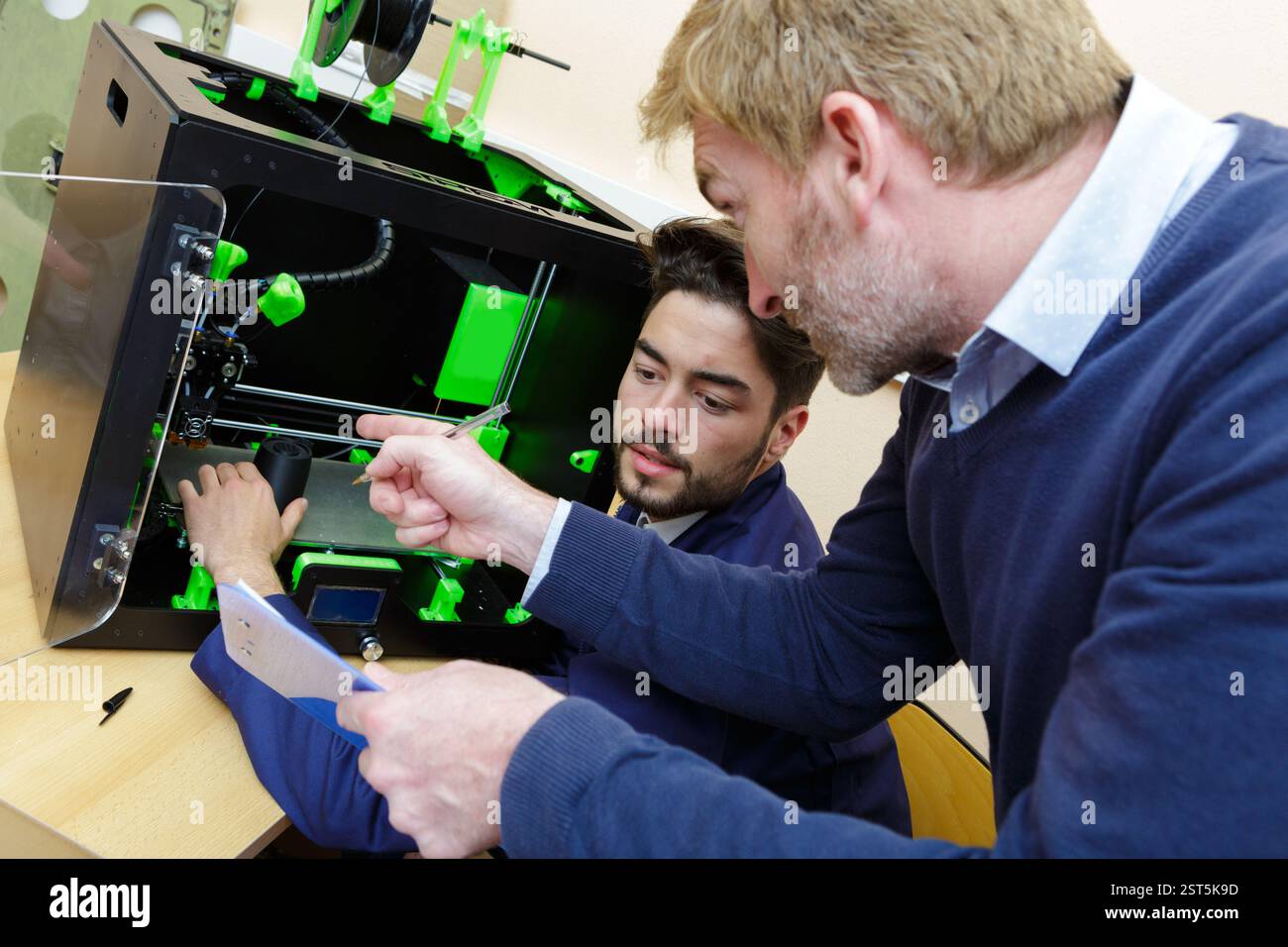 portrait of people working with 3d printer Stock Photo - Alamy