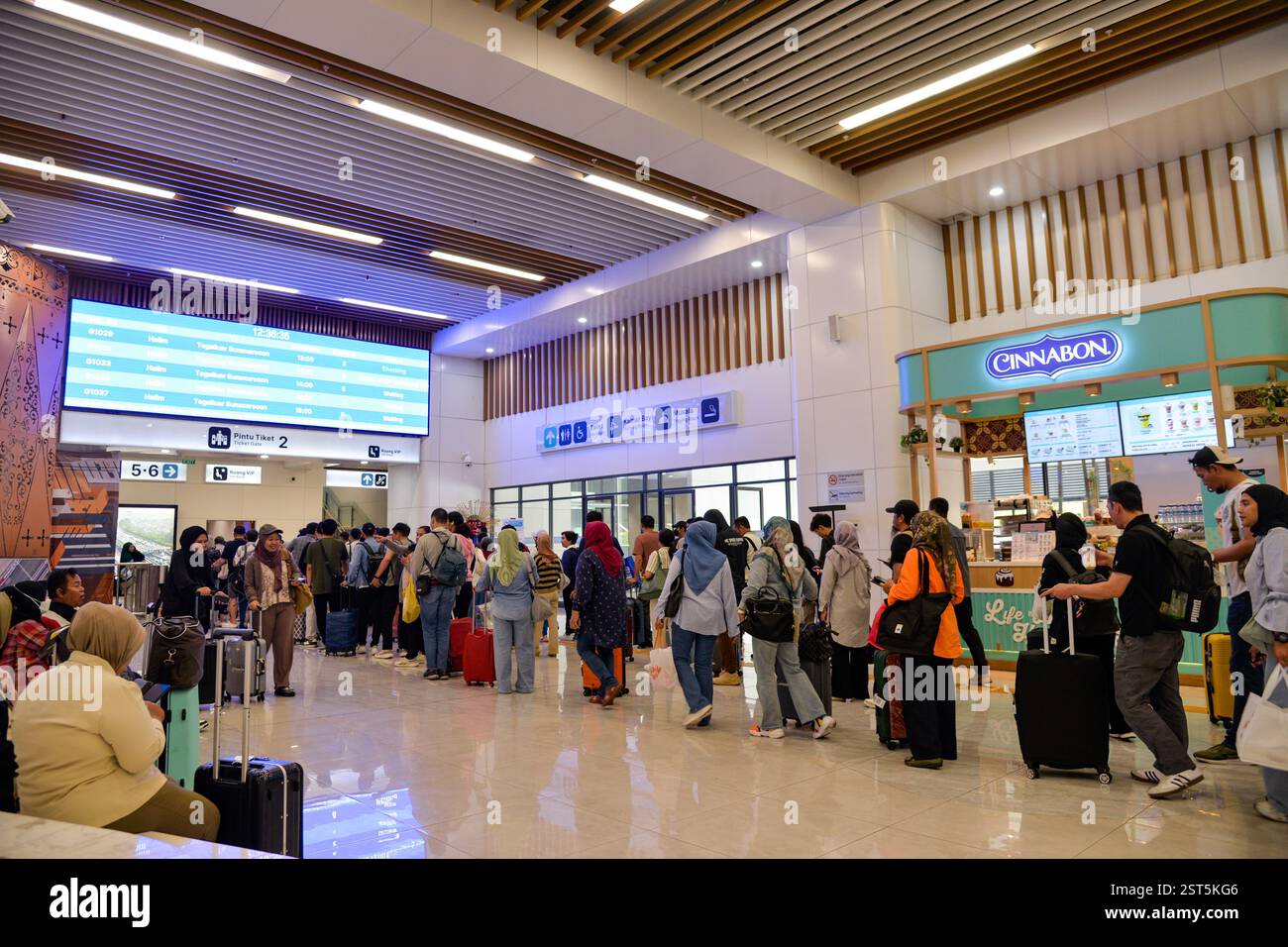 Jakarta, Indonesia. 17th Feb, 2025. Passengers check in at Halim Station of Jakarta-Bandung High ...