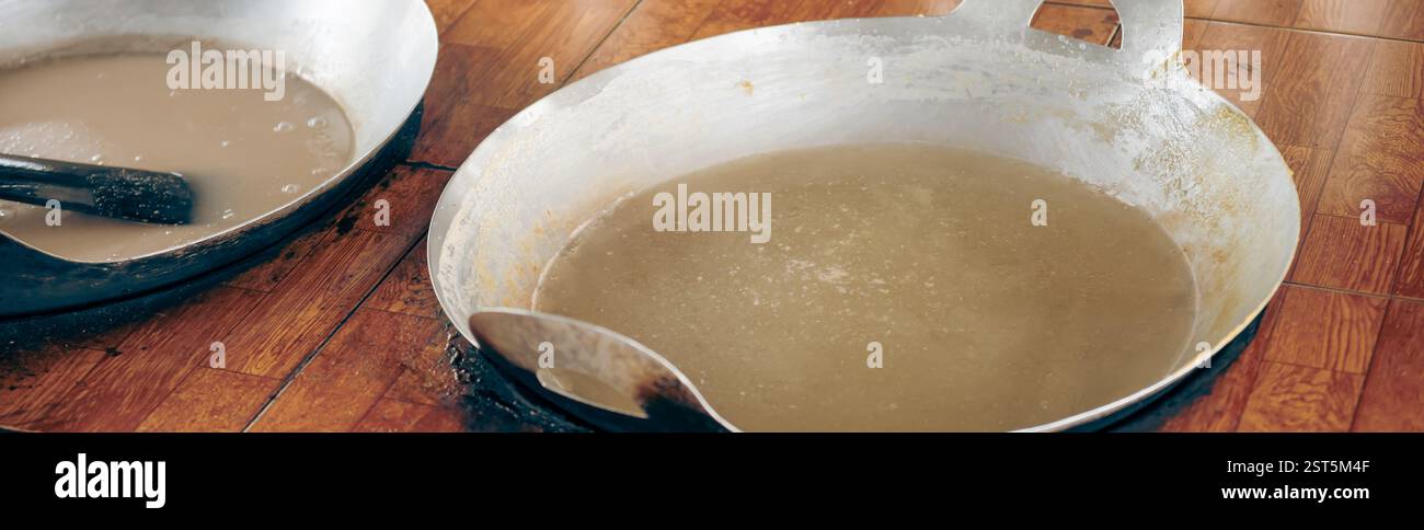 Panorama view mixture of squeezed coconut milk, cream, sugar and malt ...