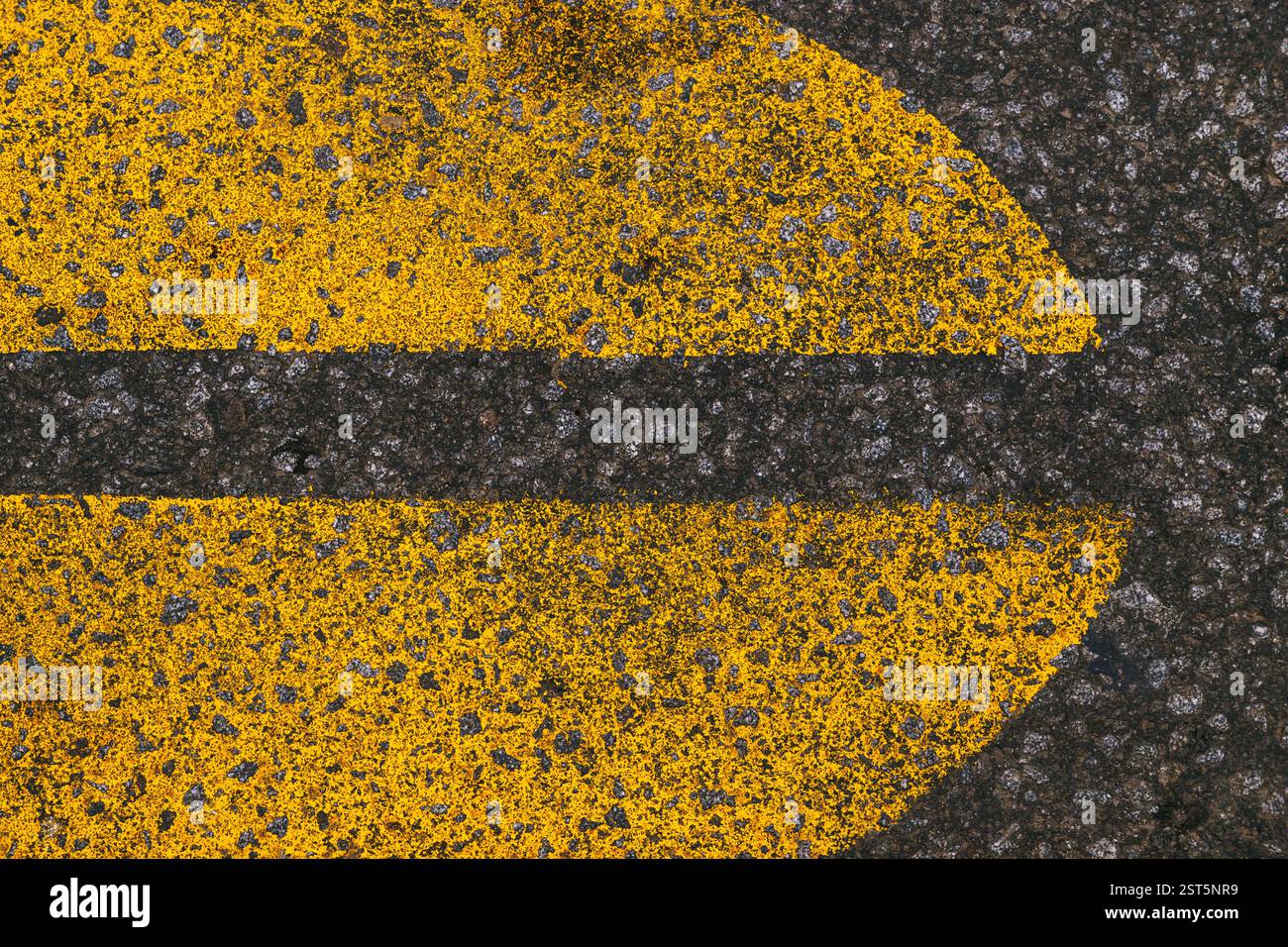 Yellow paint road marking on asphalt highway surface, top view as ...