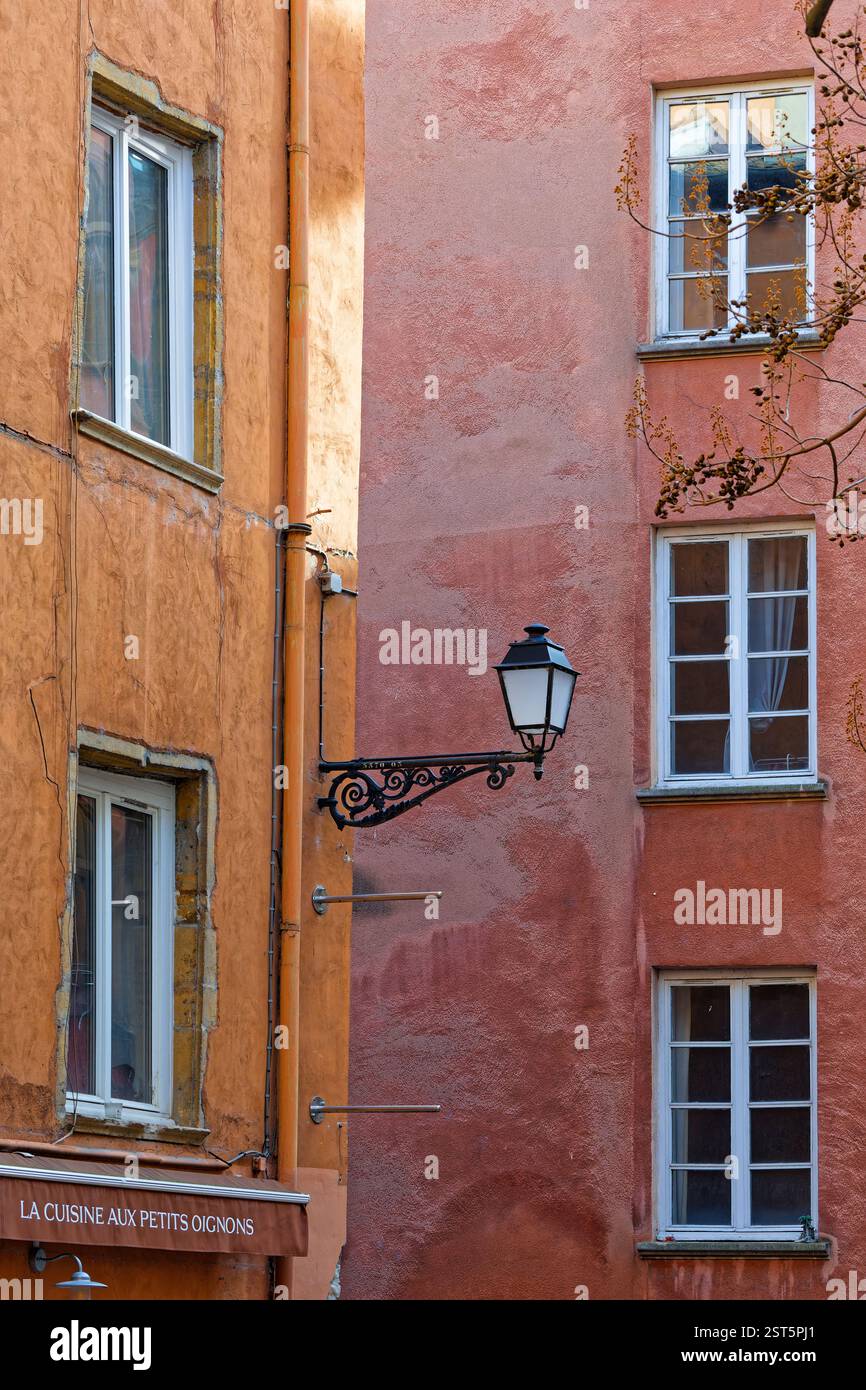 LYON, FRANCE, February 15, 2025 : Colored walls of Saint-Jean district ...
