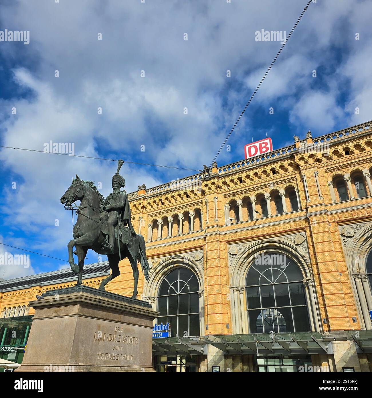 An Impressive Historical Equestrian Statue Situated in Front of a ...