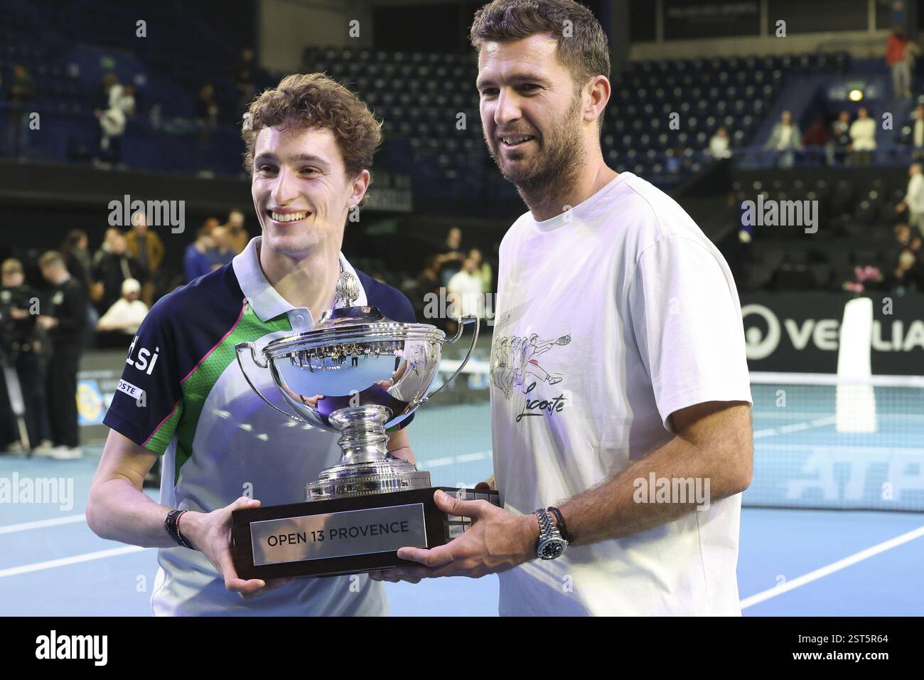 Ugo Humbert of France poses with his coach Fabrice Martin after winning ...