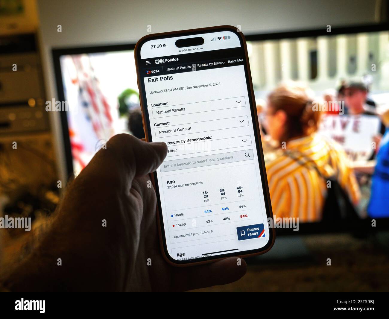 Paris, France - Nov 7, 2024: A person holds a smartphone displaying CNN ...