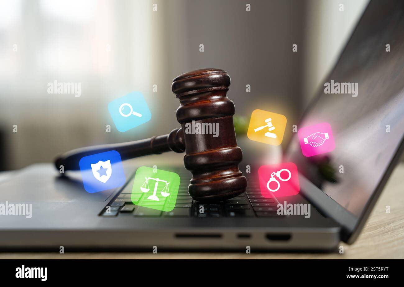 Judge's hammer on a laptop. Legal assistance. Legislative regulation of ...