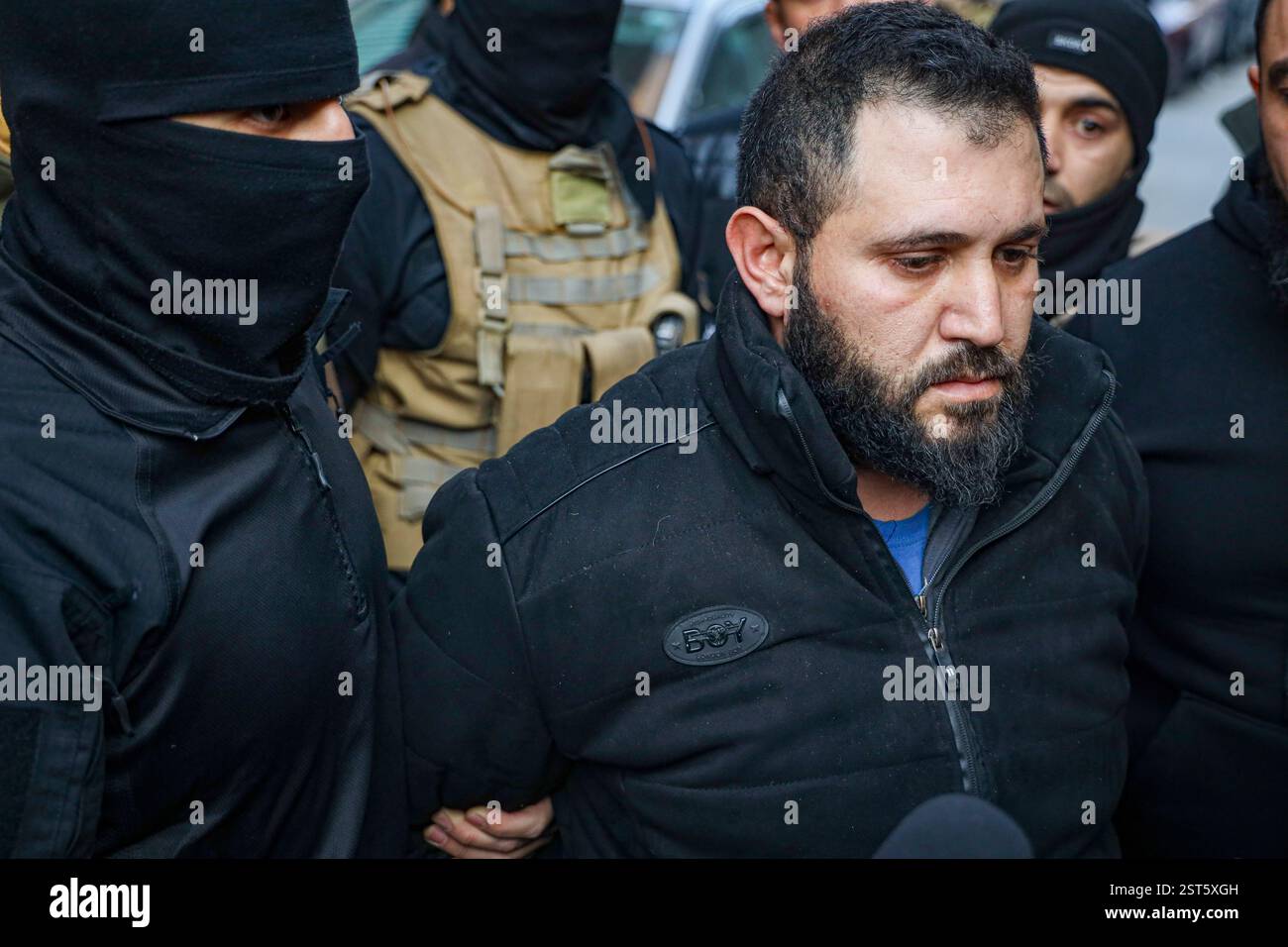 Munther Al-Jazairi, an alleged former operative with the military ...