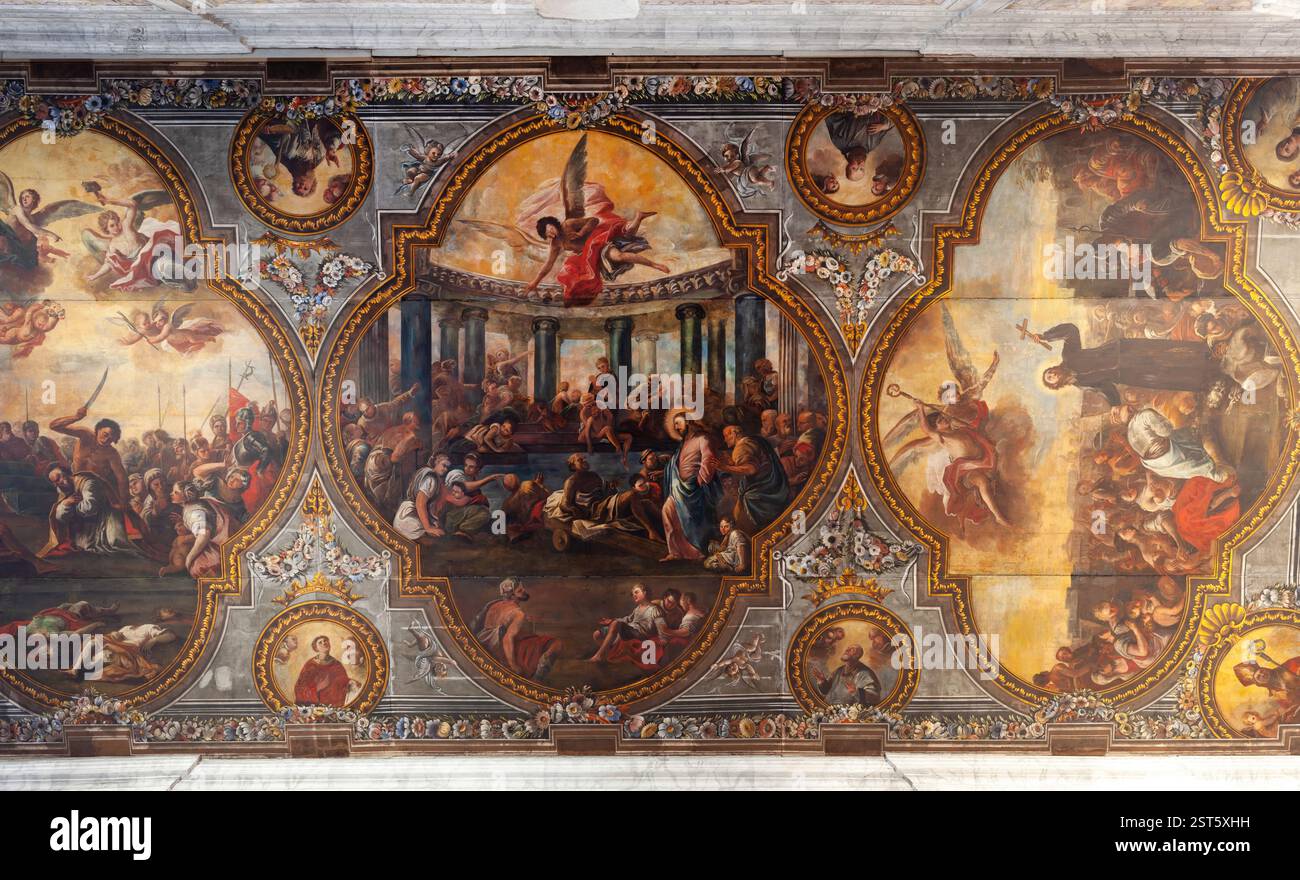 Baroque ceiling frescoes illustrating biblical scenes within a ...