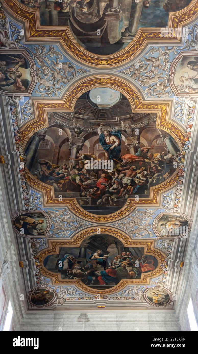 Baroque ceiling frescoes illustrating biblical scenes within a ...