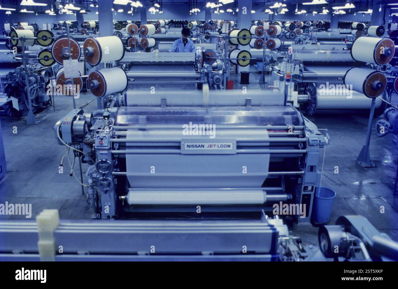 Man sets up industrial machine hi-res stock photography and images - Alamy