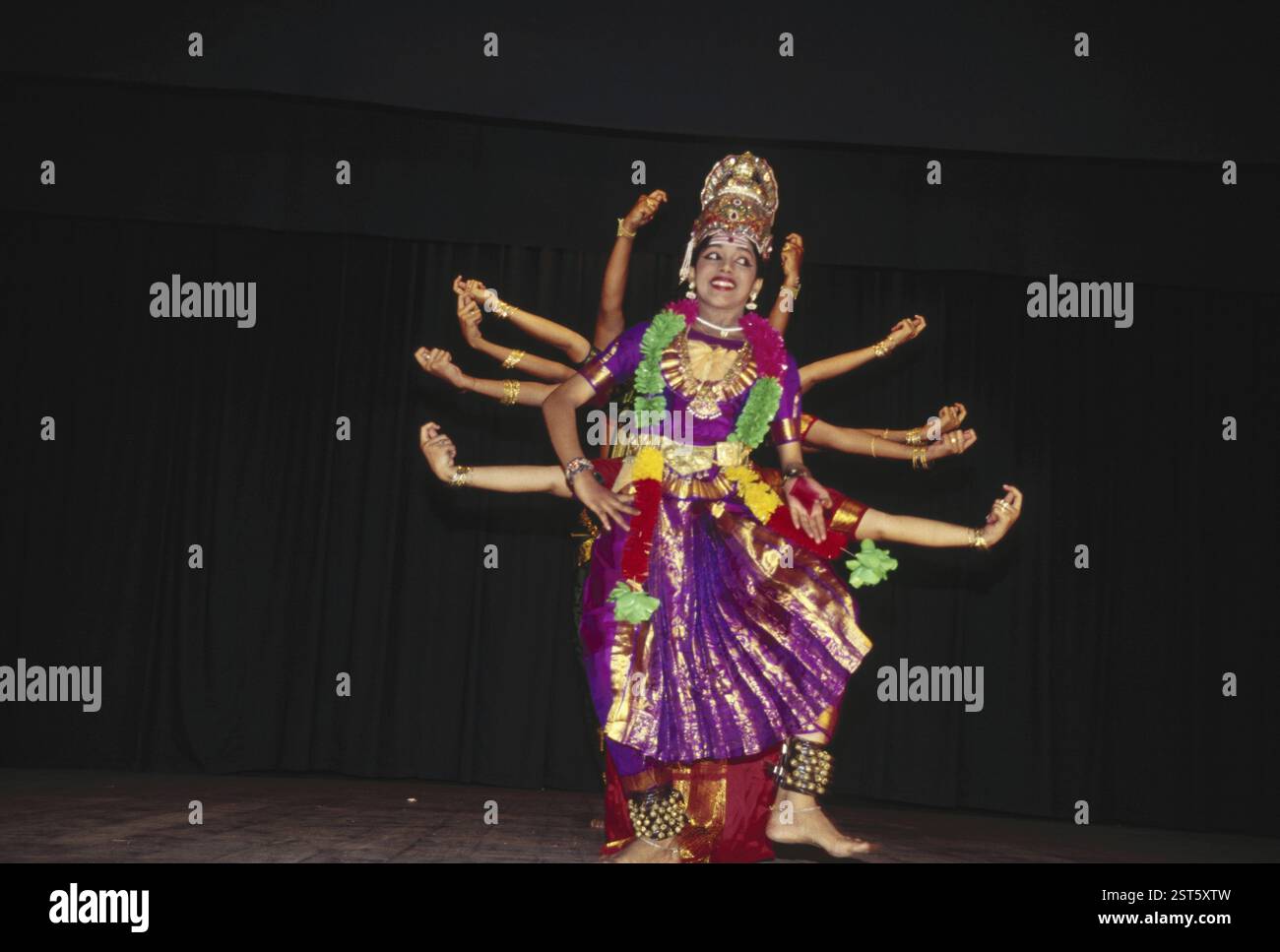Devi Dash bhuja, woman performing Goddess Durga in Bharatnatyam, India ...