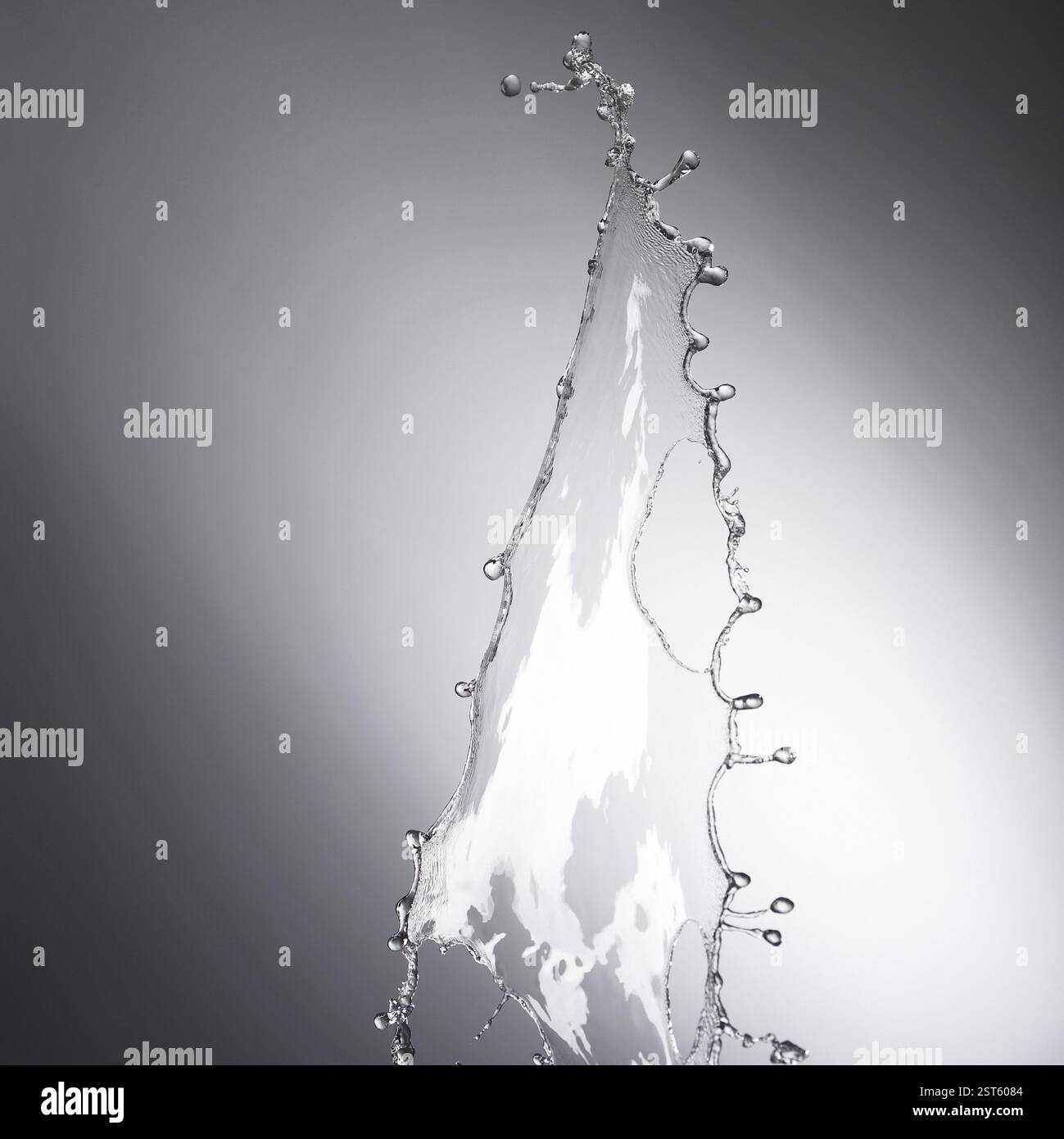 Water drop splash with grey background Stock Photo - Alamy