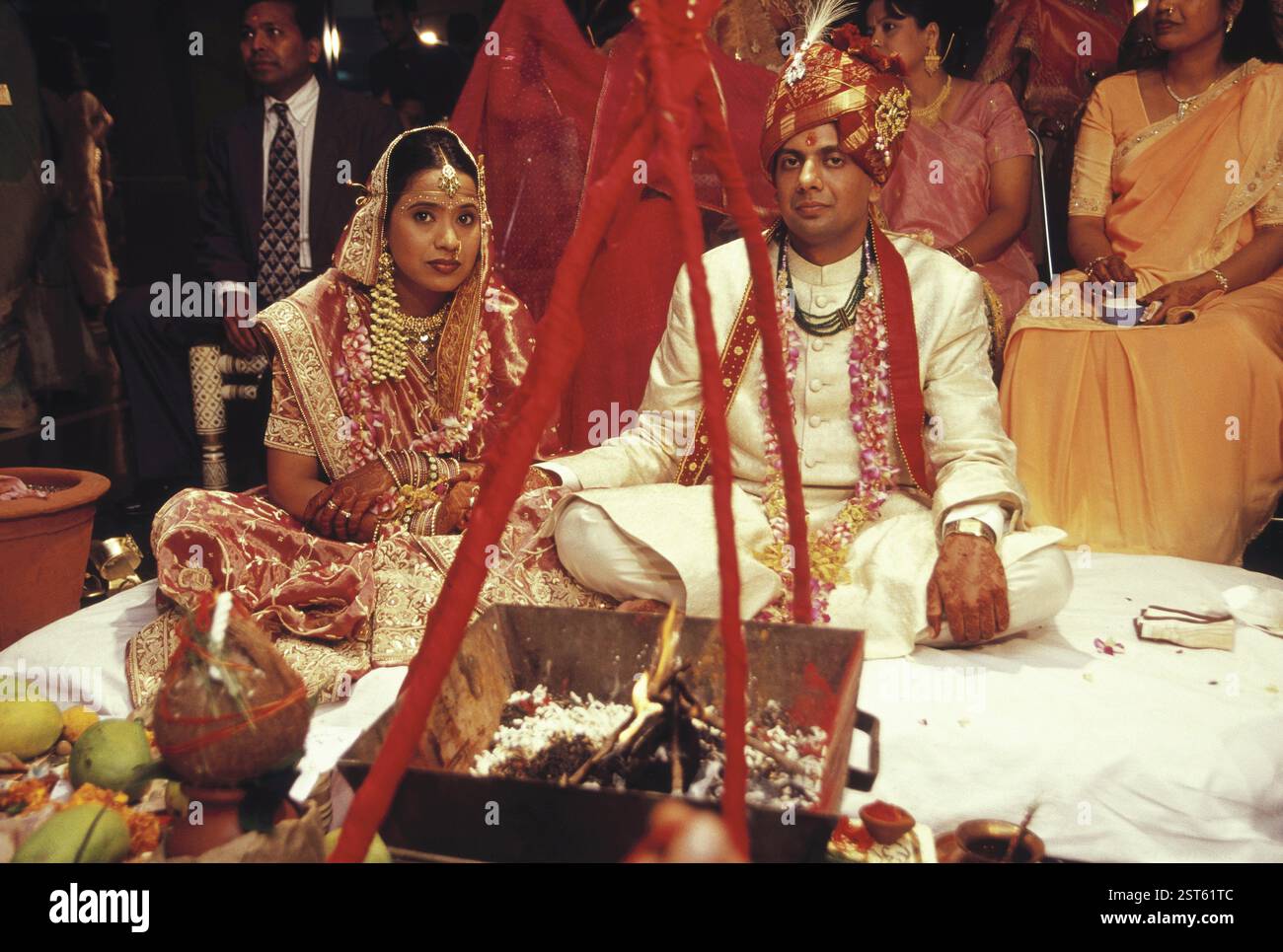 Bride and bridegroom performing vidhi in marwadi marriage ceremony MR ...