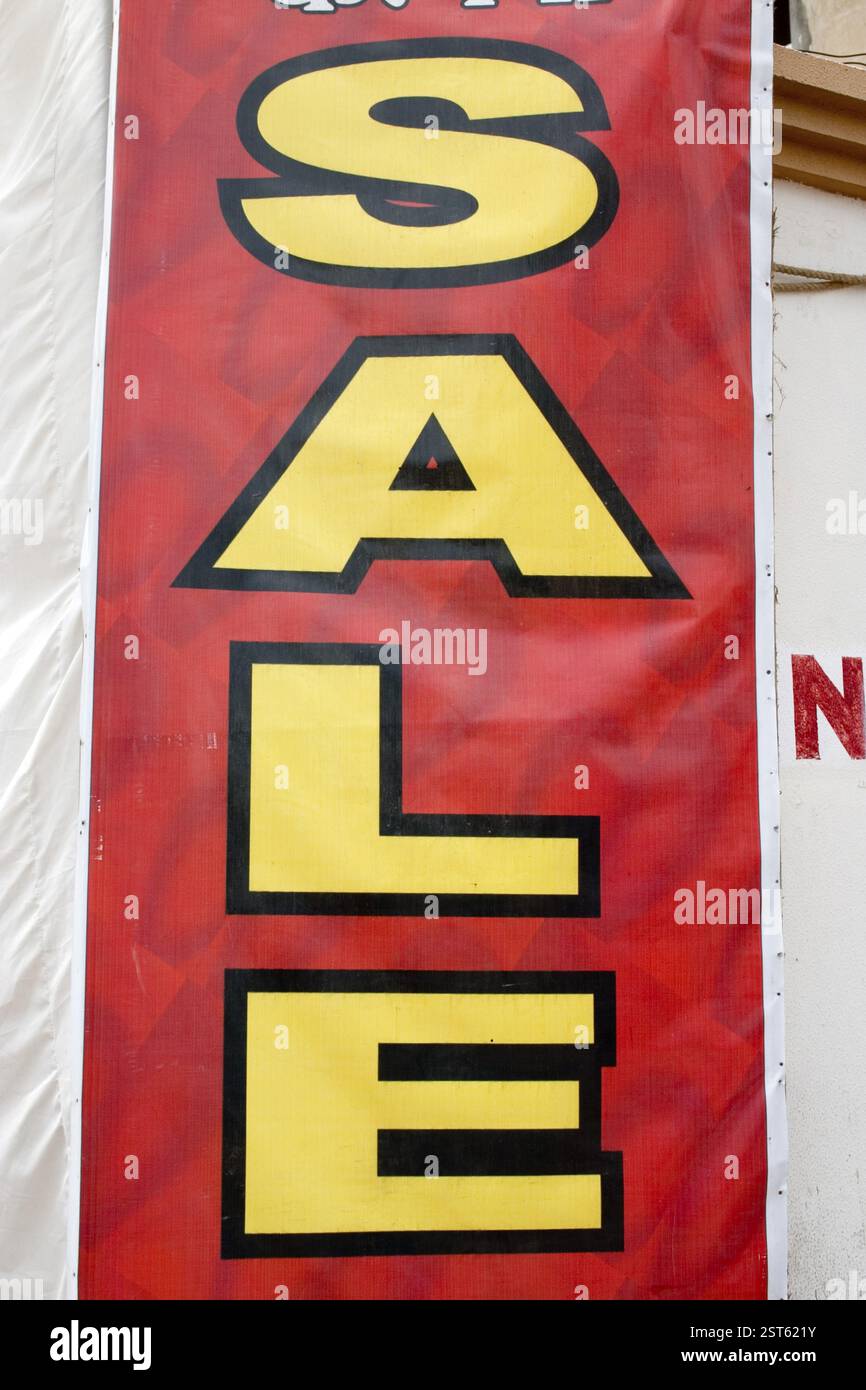 Sign board saying - SALE, English word. Yellow color alphabet, Jaipur ...