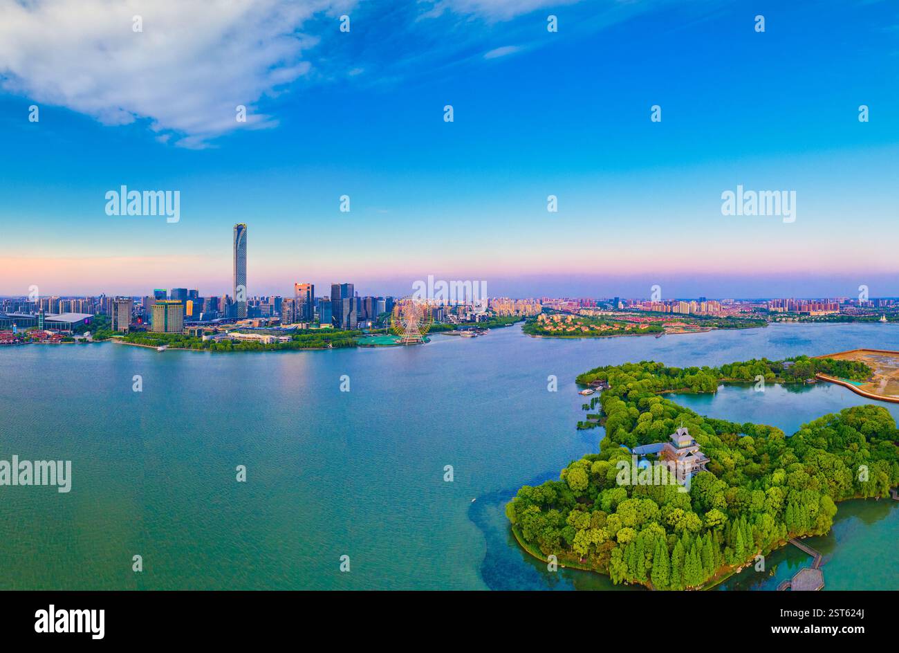 Peach Blossom Island and the other shore of Lake East CBD in Suzhou ...