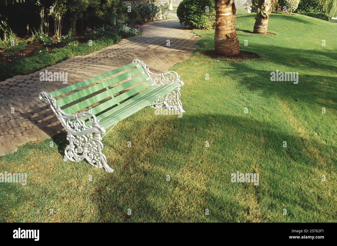Cast iron bench in garden, bombay mumbai, maharashtra, india Stock ...