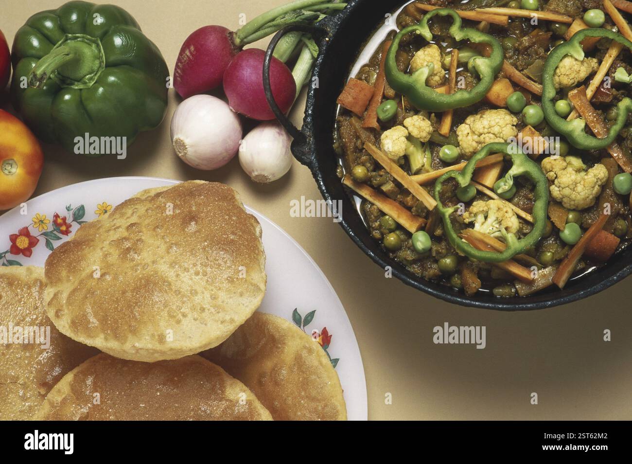 Vegetarian dish, Vegetable Kadhai Kurma and Puri served in plate Stock ...