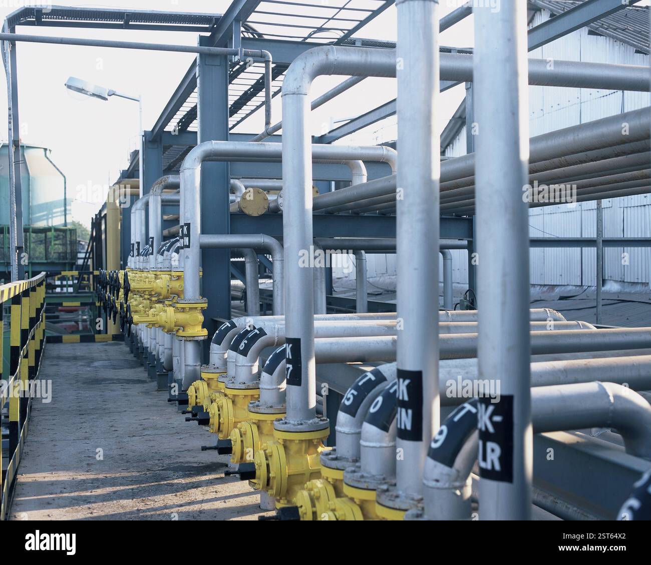 Indian Industry petrochemical factory showing pipe lines with valve ...