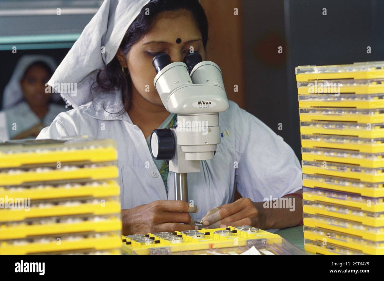 Women tech factory hi-res stock photography and images - Alamy