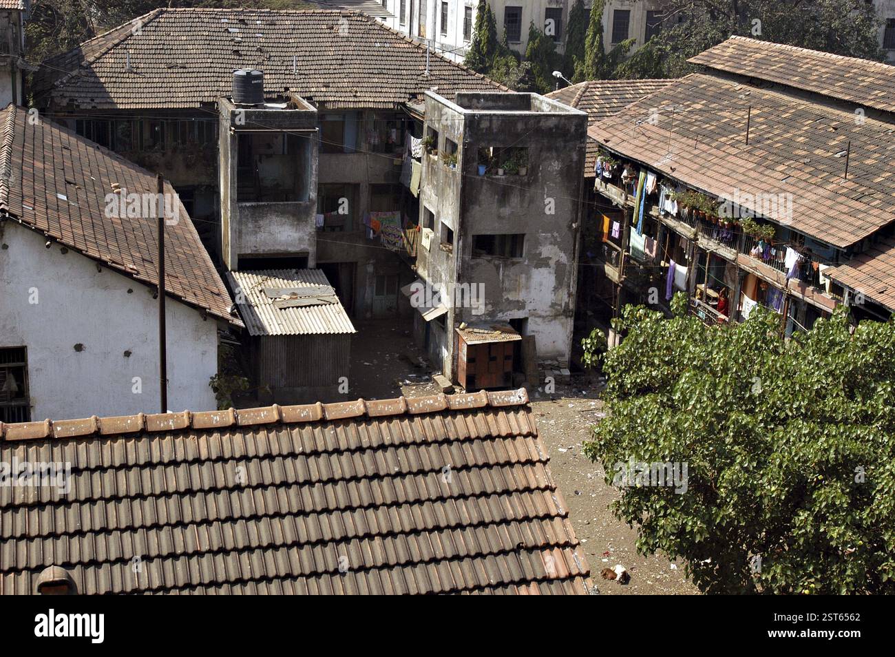 Old dilapidated buildings with Manglorean tiles known as Chawls ...