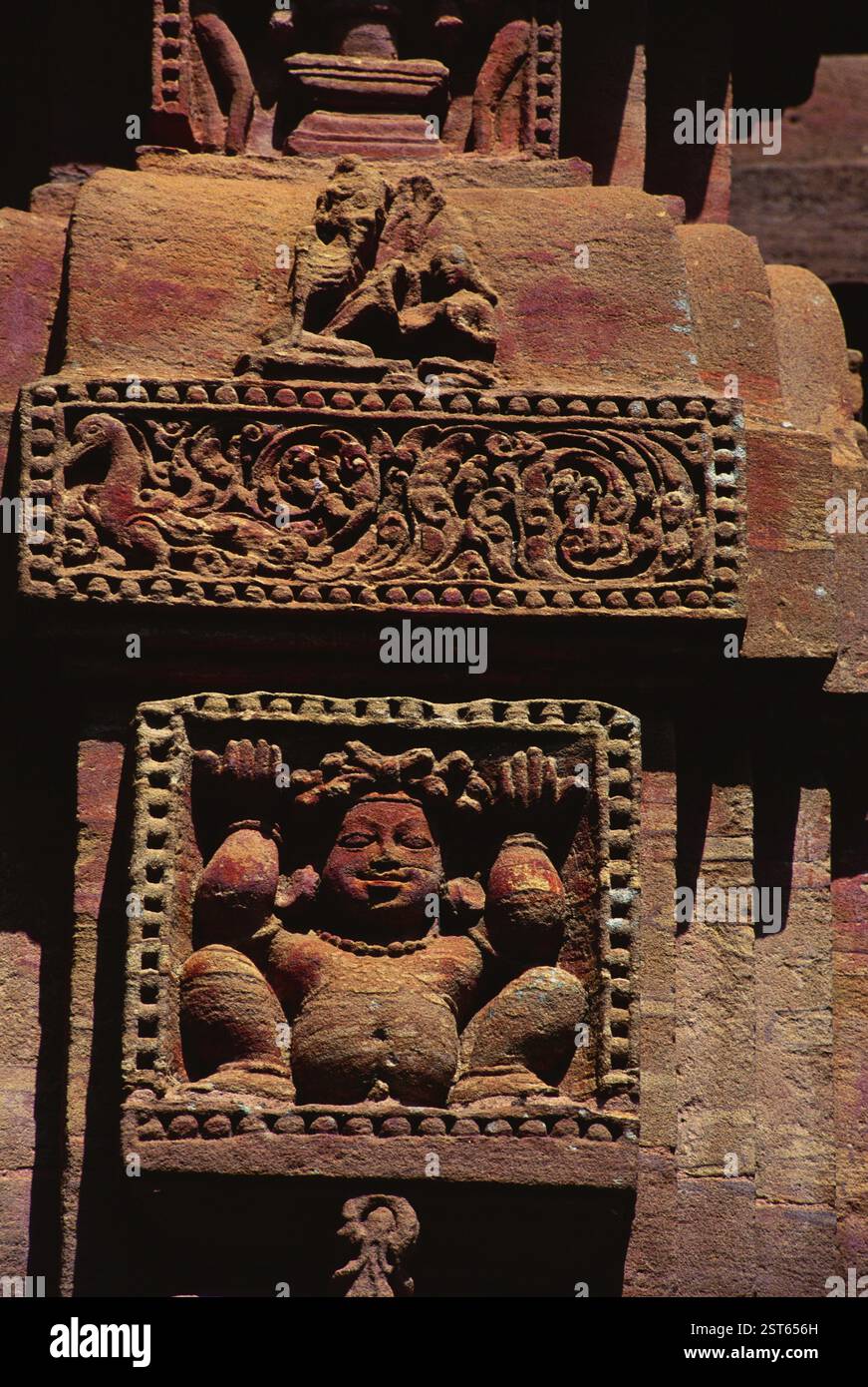 Carving of man holding pillar, Mukteshwar temples, Bhubaneshwar, Orissa ...