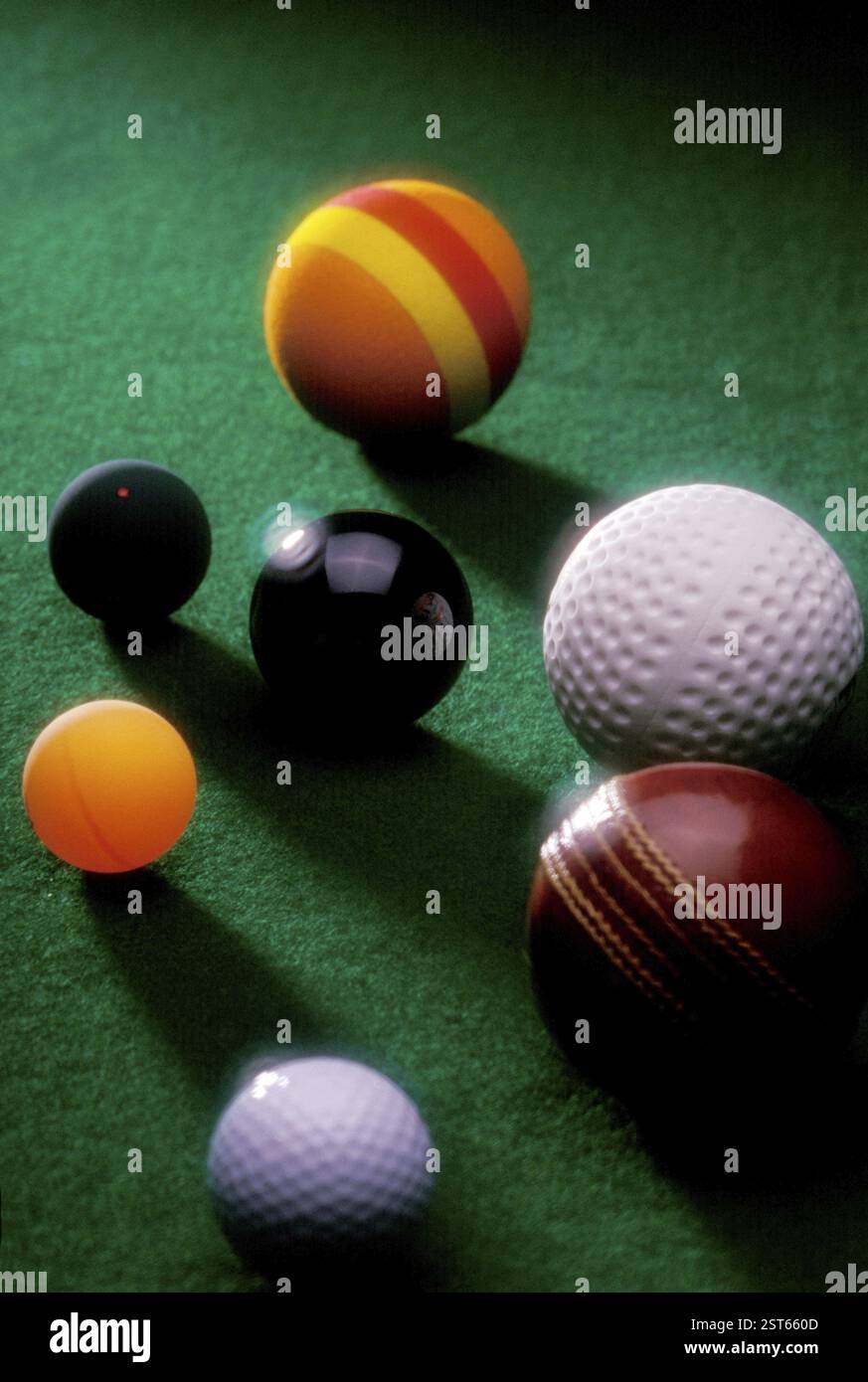 Golf cricket billiard snooker squash balls on green table Stock Photo ...