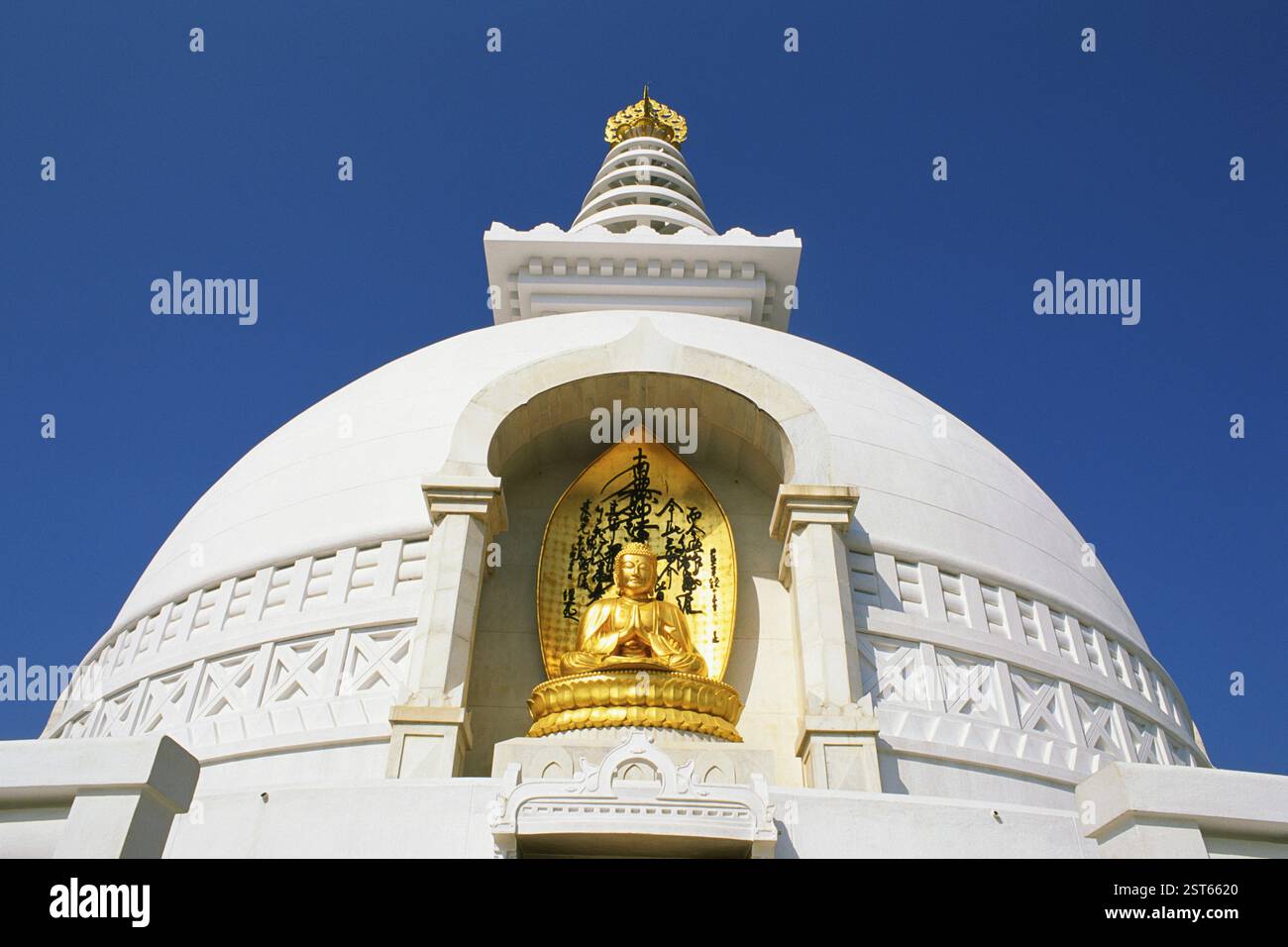 Golden idol of Buddha on Vishwa Shanti stupa, Rajgir, Bihar, India ...